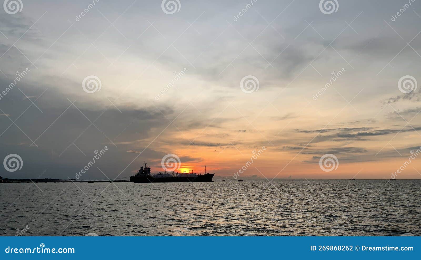 Ship into the sunset stock photo. Image of ship, horizon - 269868262