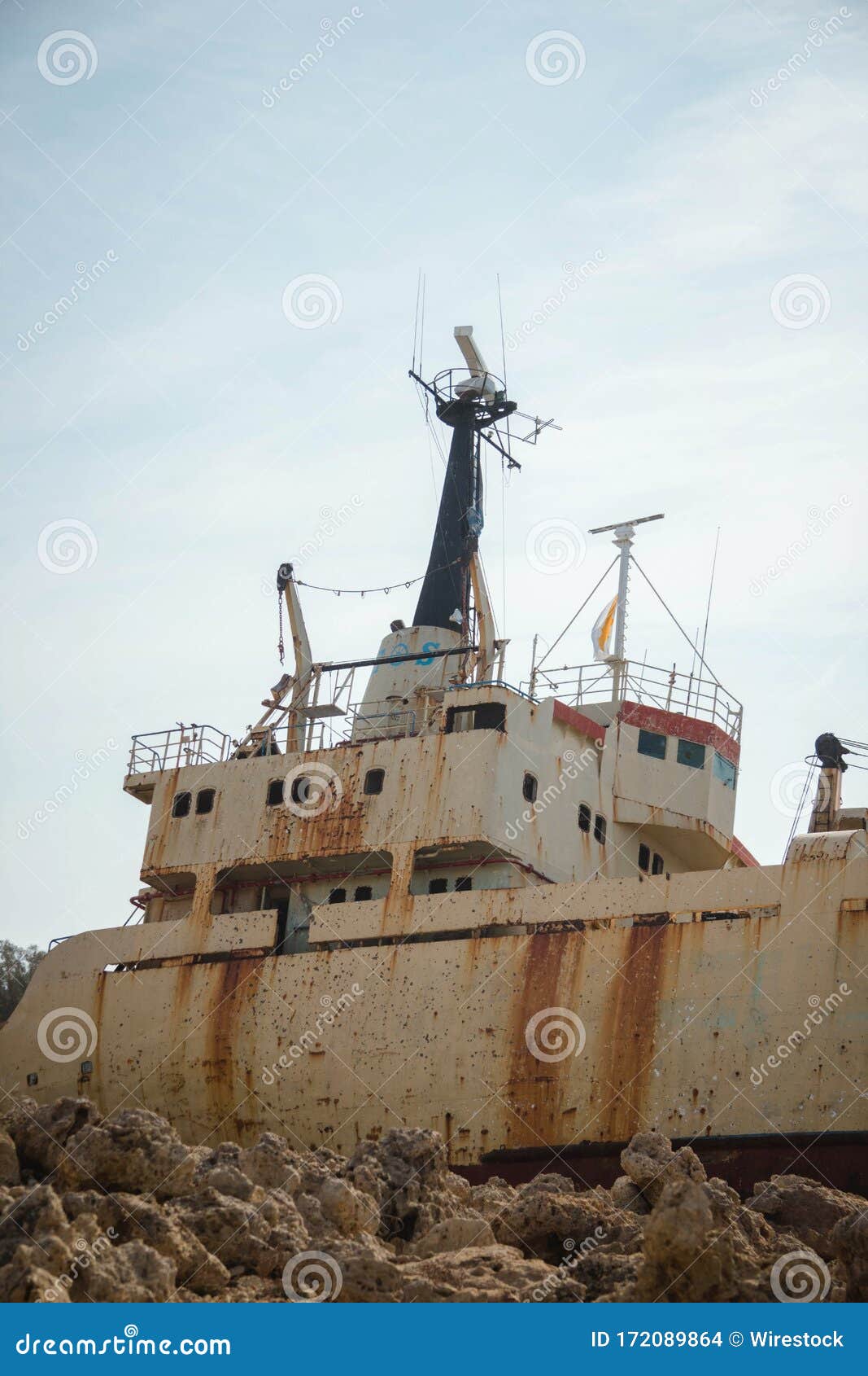 Ship on the Water Next To the Stones of the Shore during Daytime Stock ...