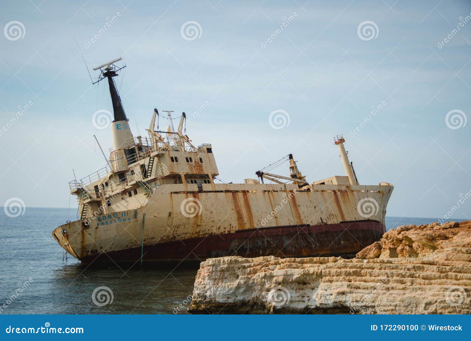 Ship on the Water Next To the Stones of the Shore during Daytime ...