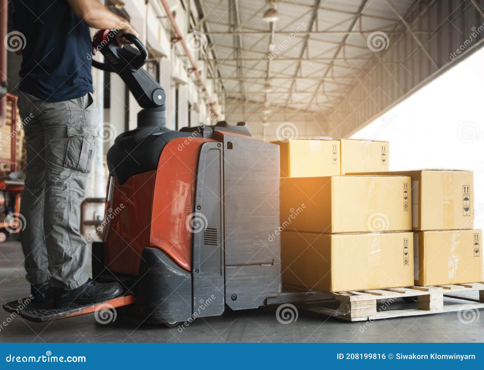 Shipment Boxes. Cargo Warehousing. Worker Driving Electric Forklift ...