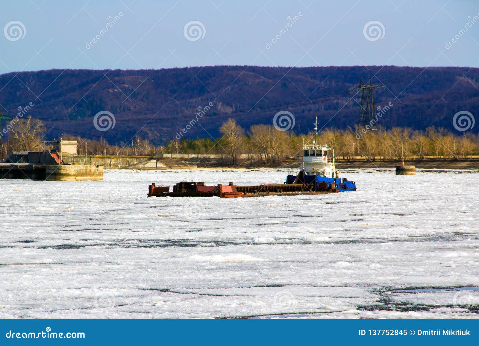 A Shipping Barge Stands in the Middle of an Icy River Stock Image ...