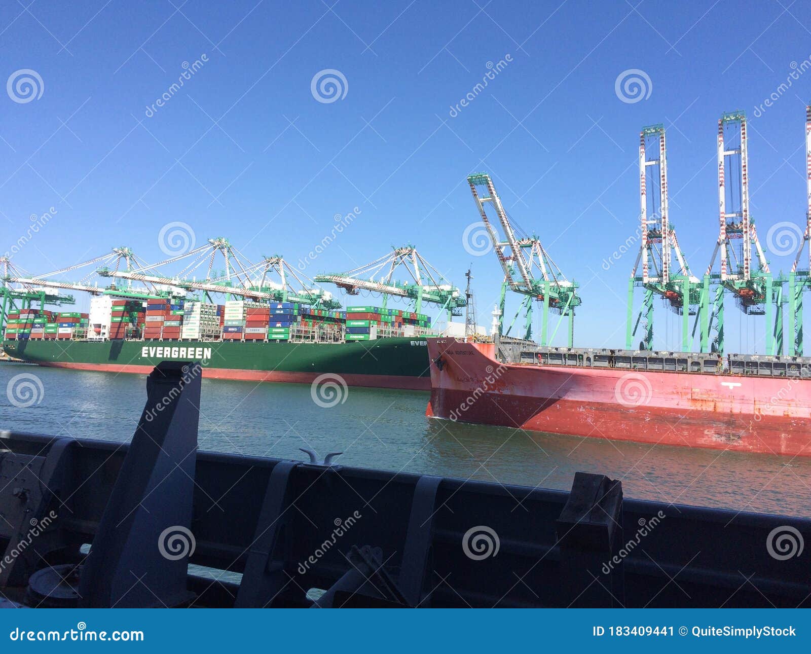 Shipping Container Cranes for Loading Ocean Cargo Ship Vessel Editorial ...