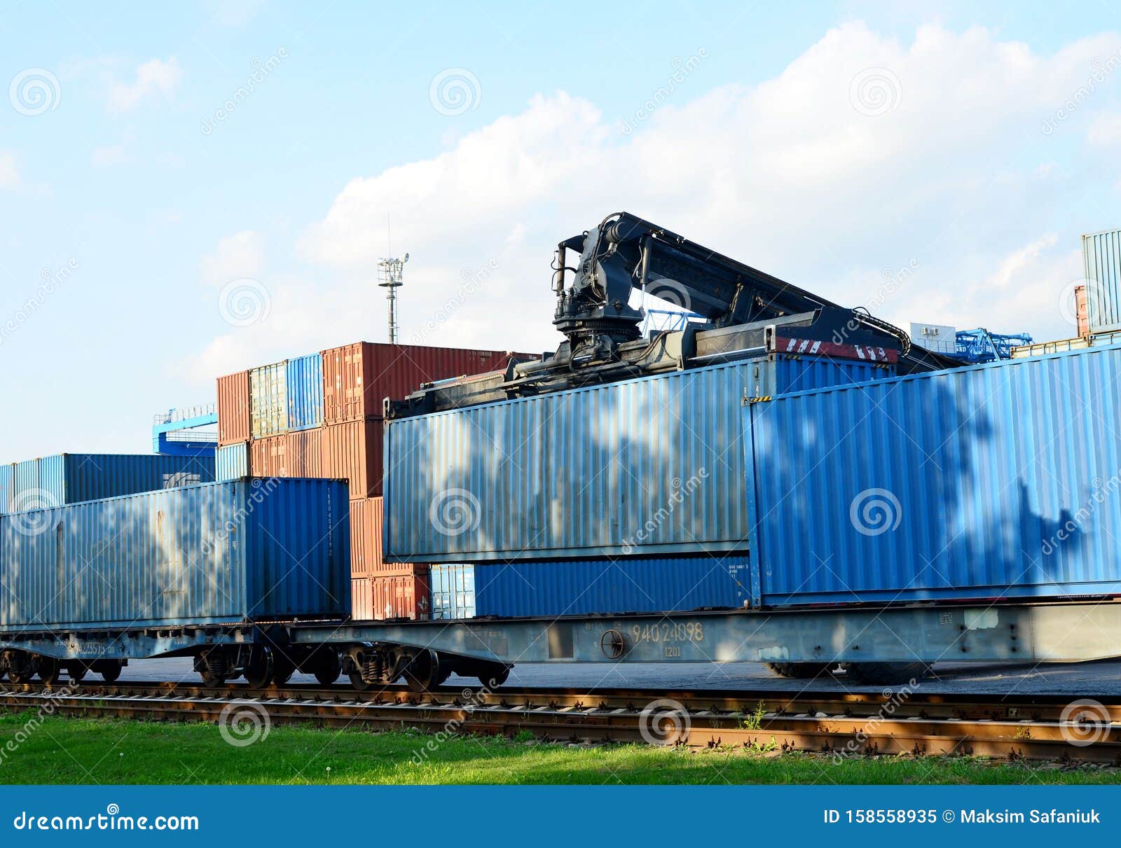 Shipping Container Loading by Richtracker on the Freight Rail Car at ...