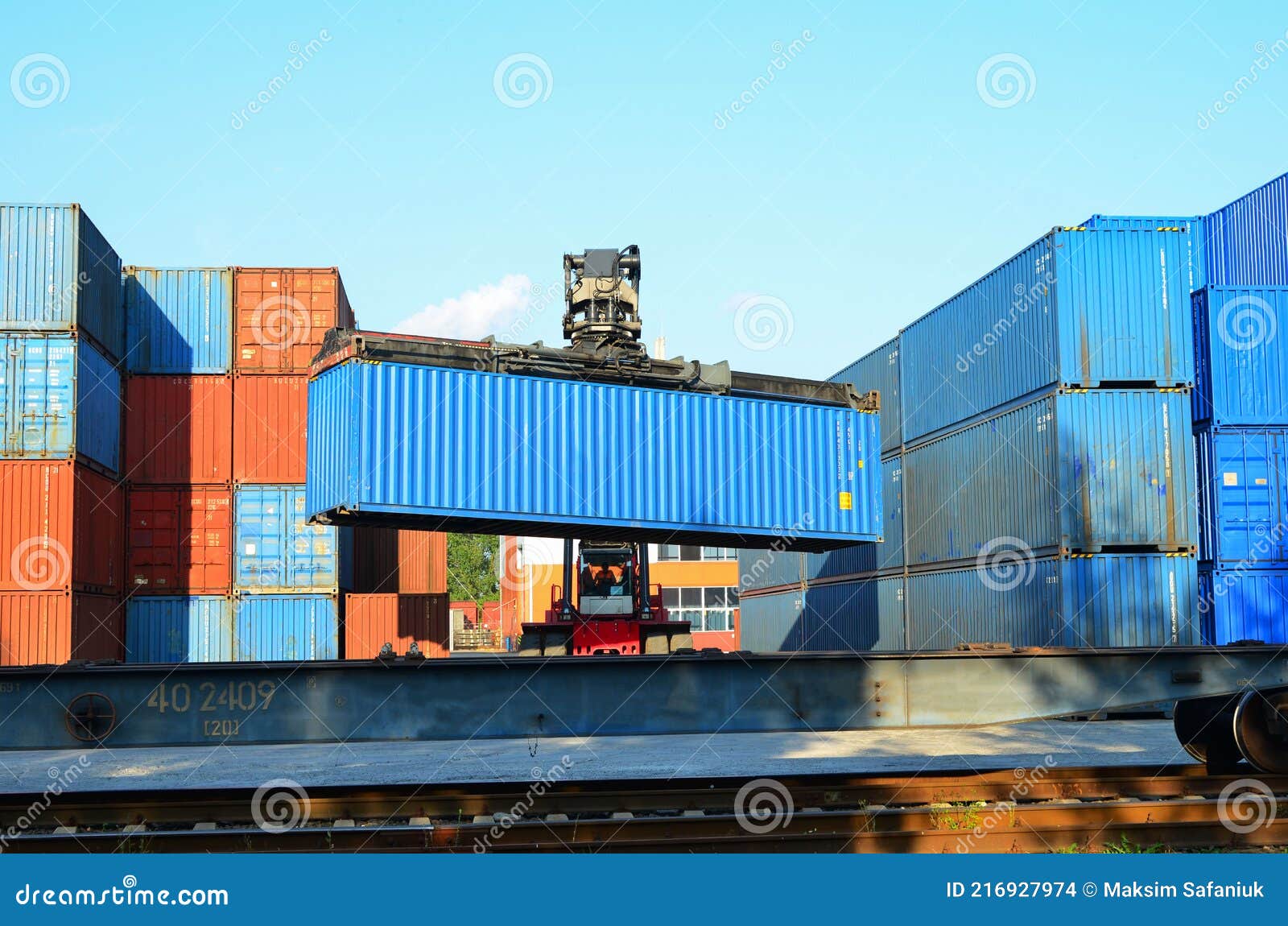 Shipping Container Loading by Richtracker on the Freight Rail Car at ...