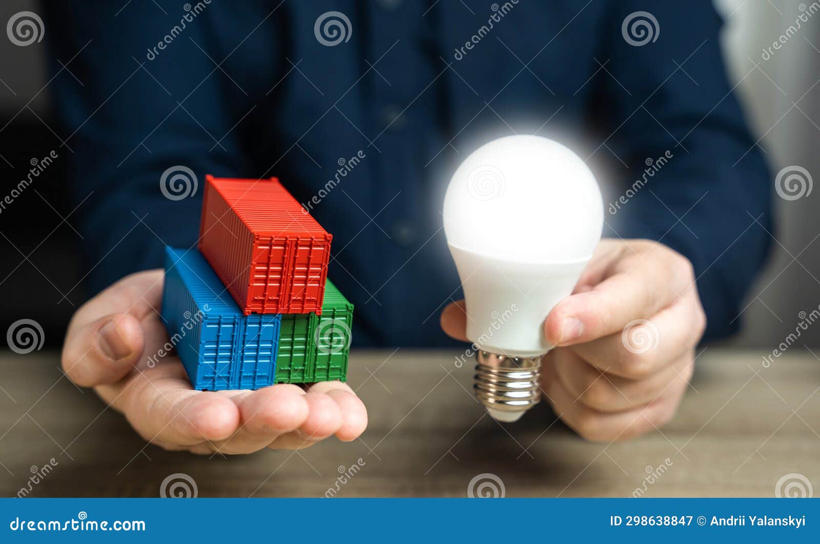 Shipping Containers and an Idea Light Bulb in Hands. Stock Image ...