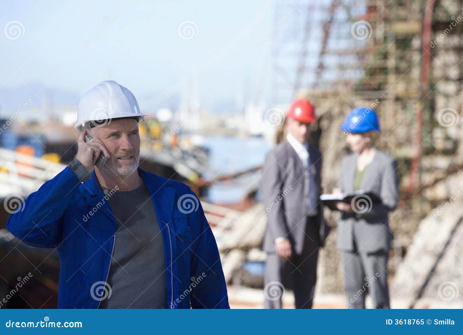 A Shipping Engineer Talking on Phone Stock Image - Image of crane ...