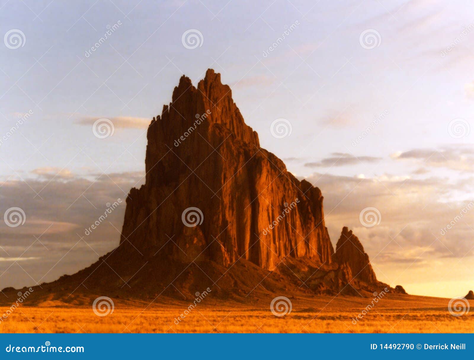 Shiprock in the Early Morning Sun Stock Photo - Image of desert, grass ...