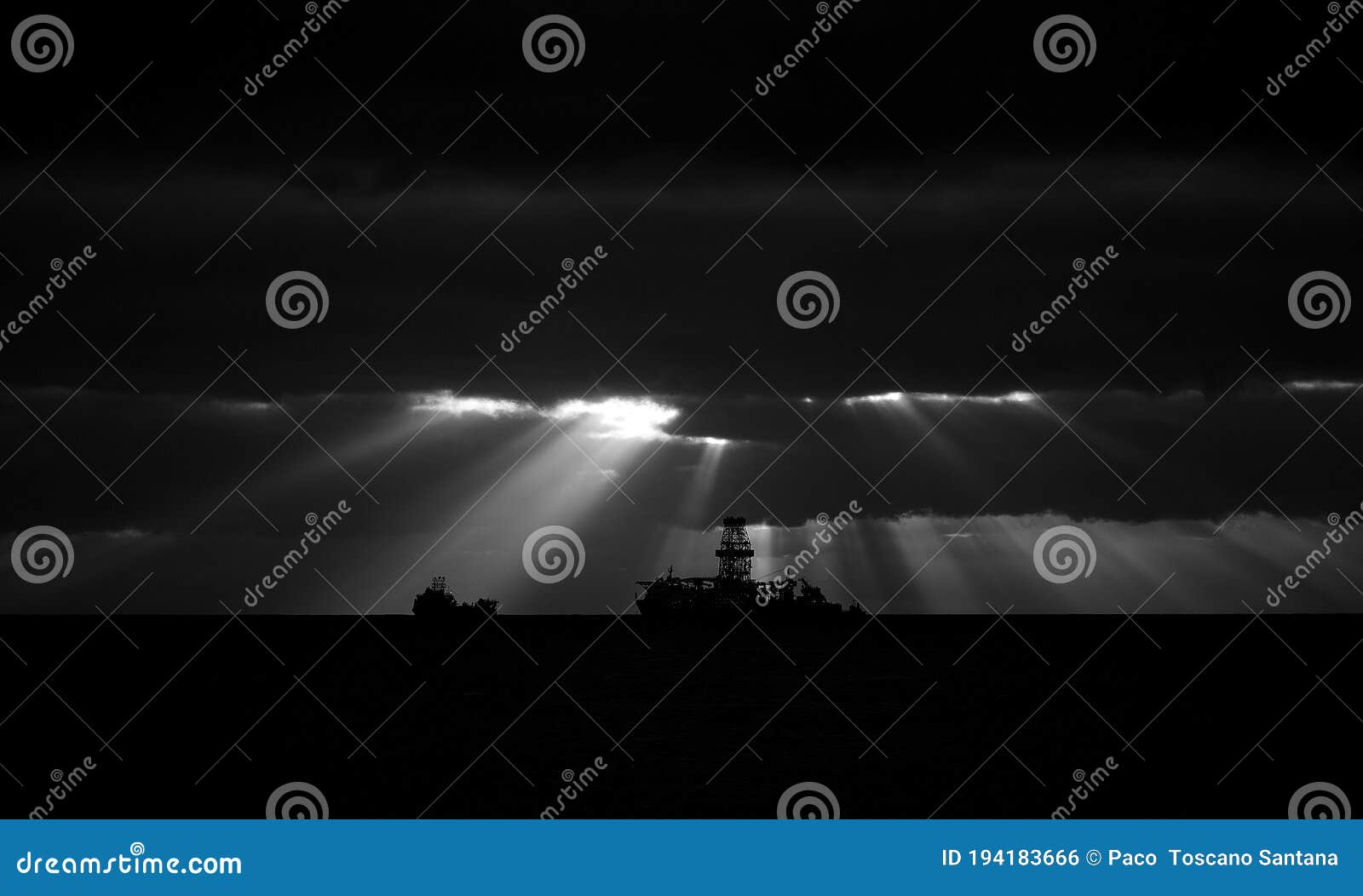 Ships at dawn and sun rays stock photo. Image of light - 194183666