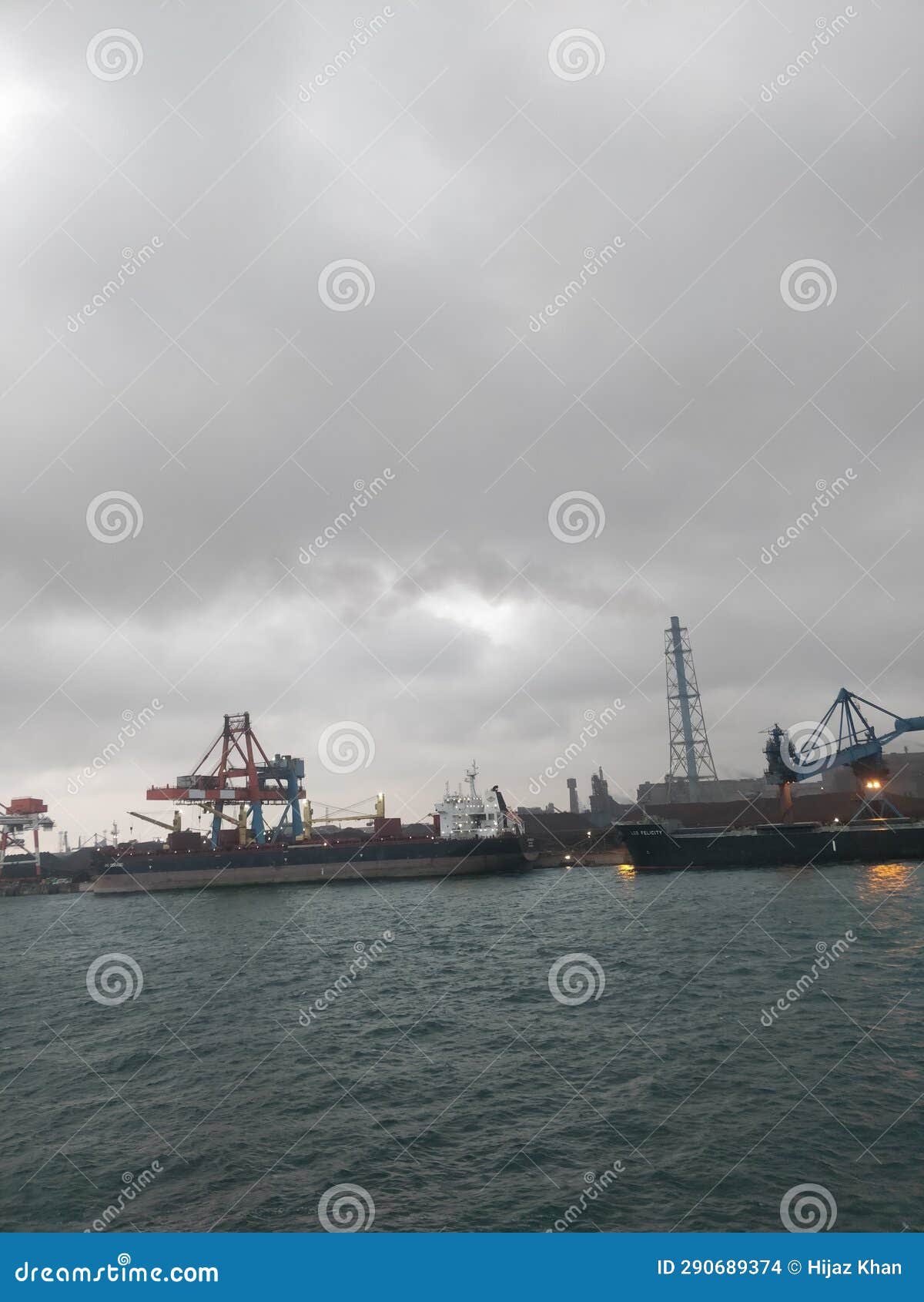 Ships Loading Cargo in the Small Port Stock Photo - Image of port ...