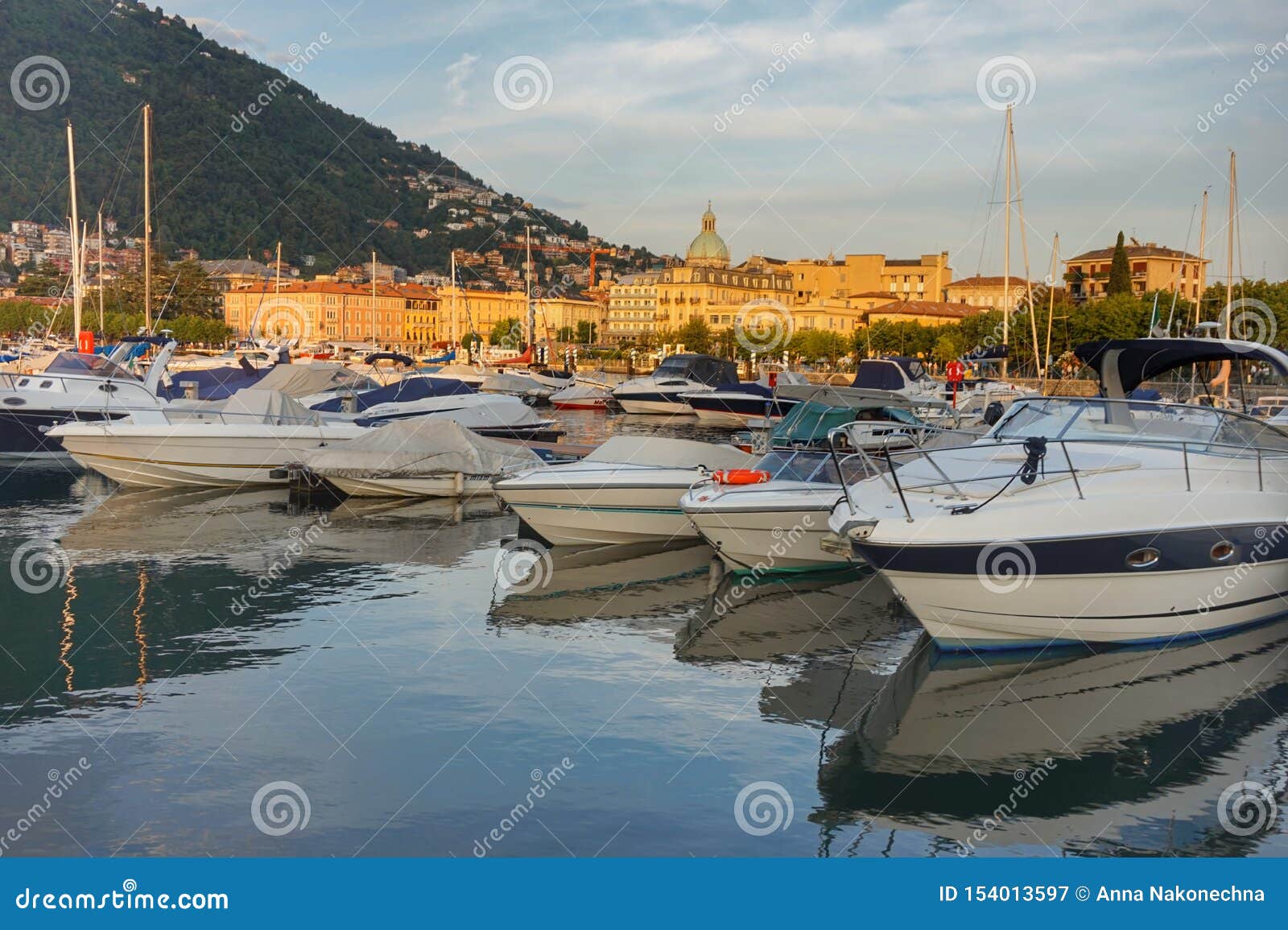 Ships Moored in the Harbor on Lake Como in the City of Como. Sunset ...