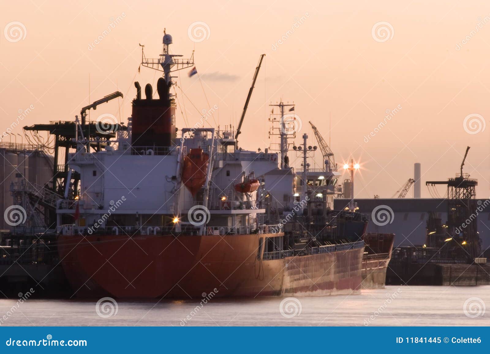 Ships in Port at Red Sunrise Stock Image - Image of crane, colors: 11841445