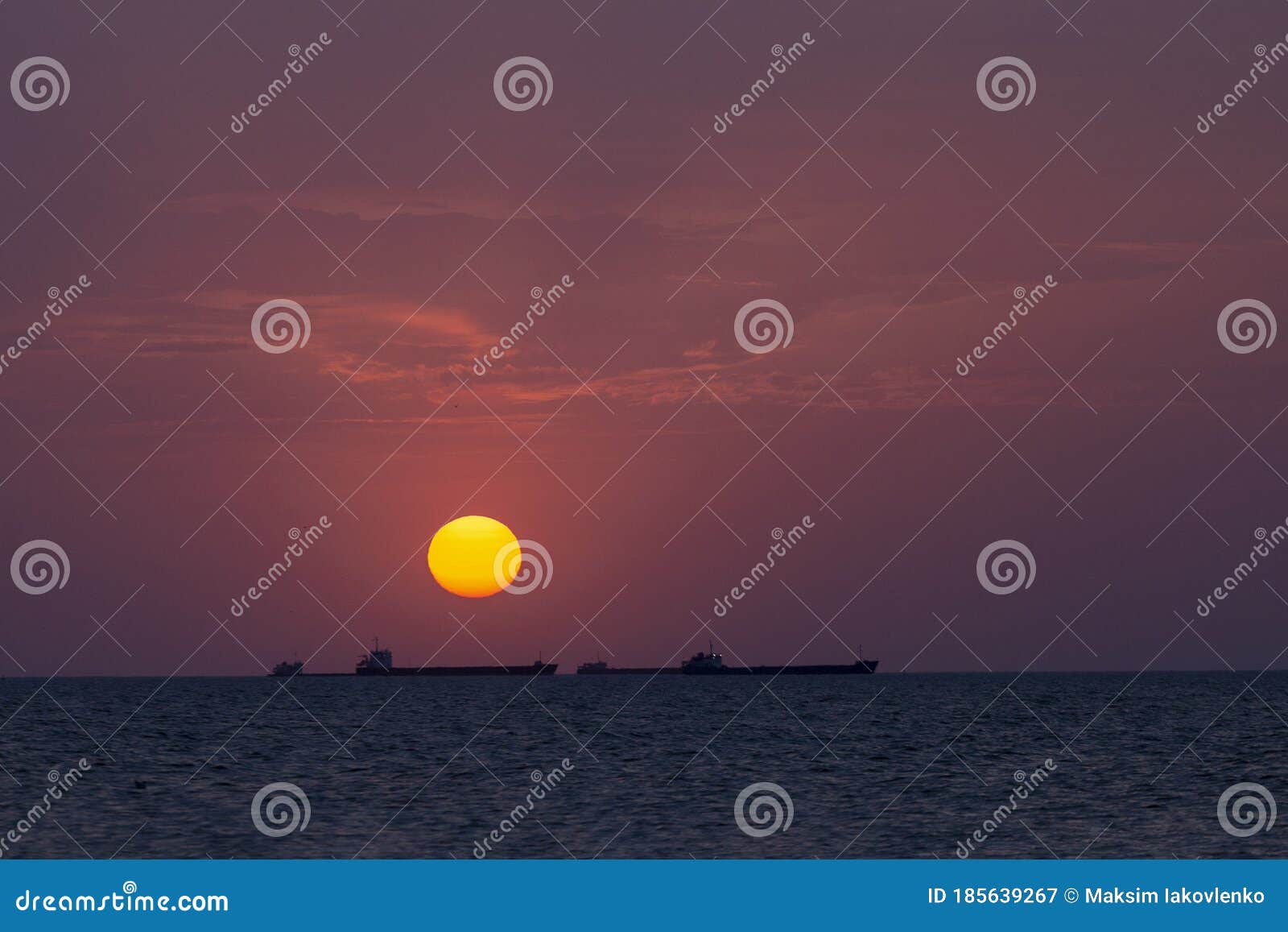 Ships at Sunset Float on the Horizon Stock Image - Image of light ...