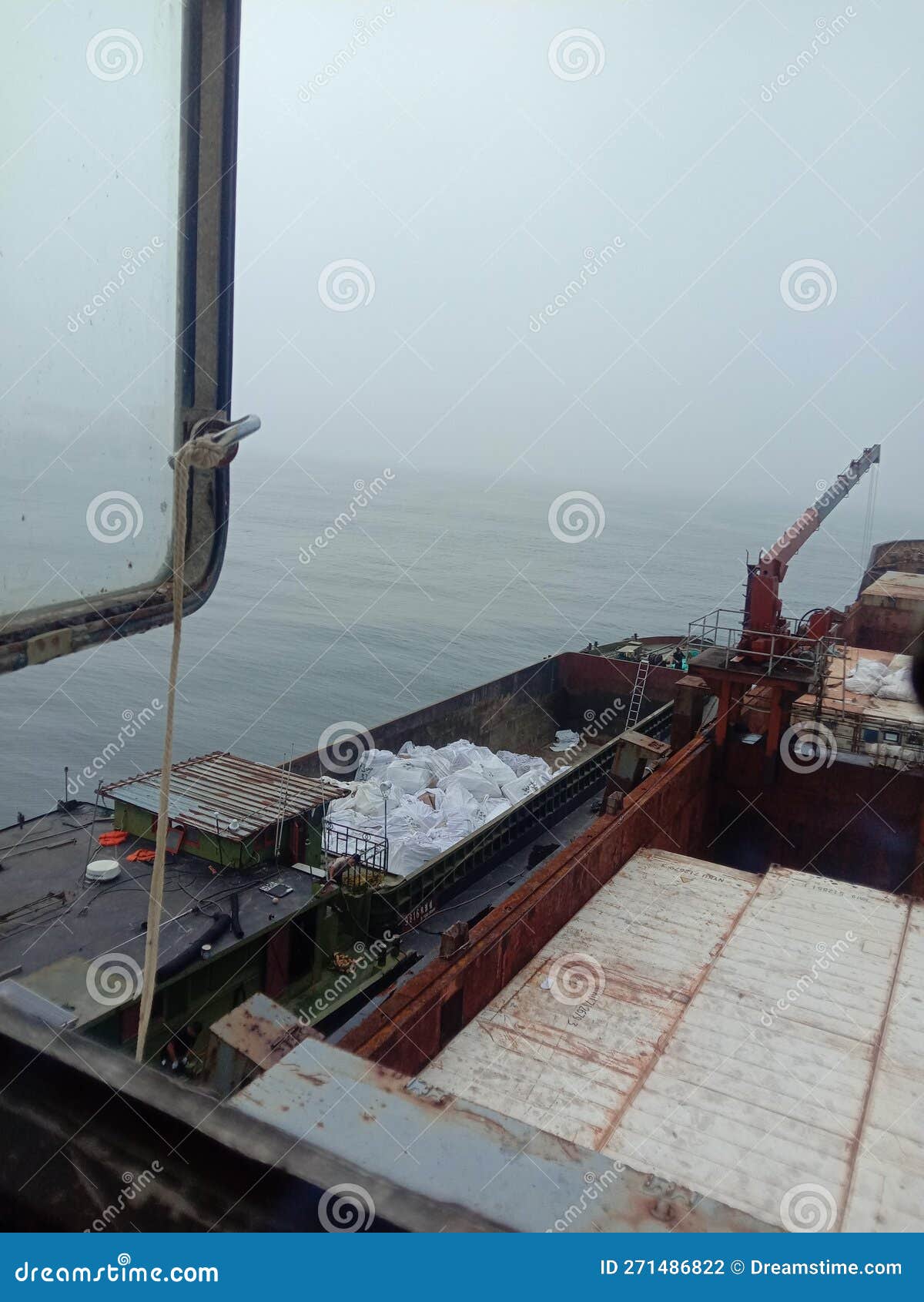 Ships Unloading Cargo in the Middle of the Sea Stock Photo - Image of ...