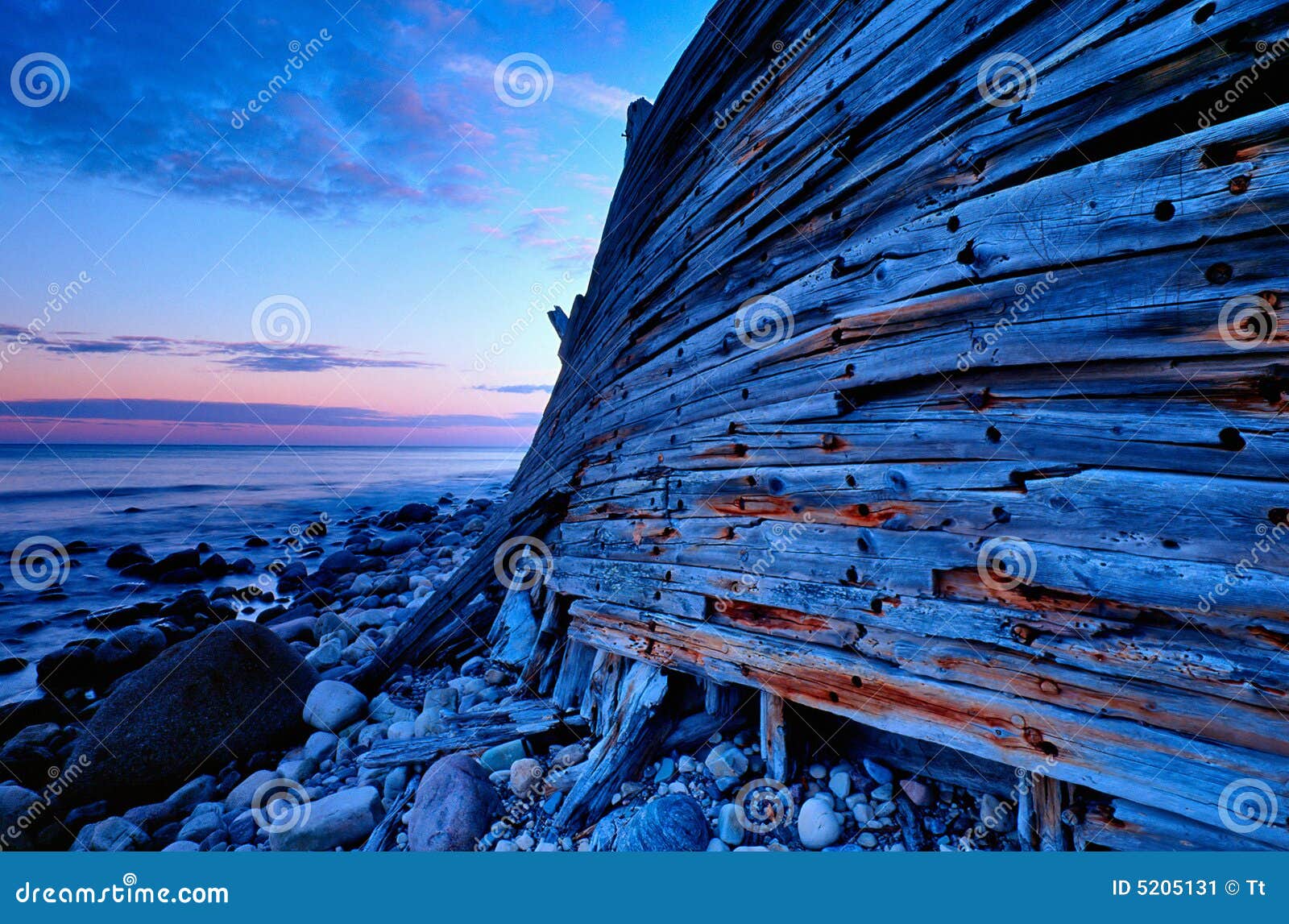 Shipwreck on the beach stock image. Image of dusk, aground - 5205131