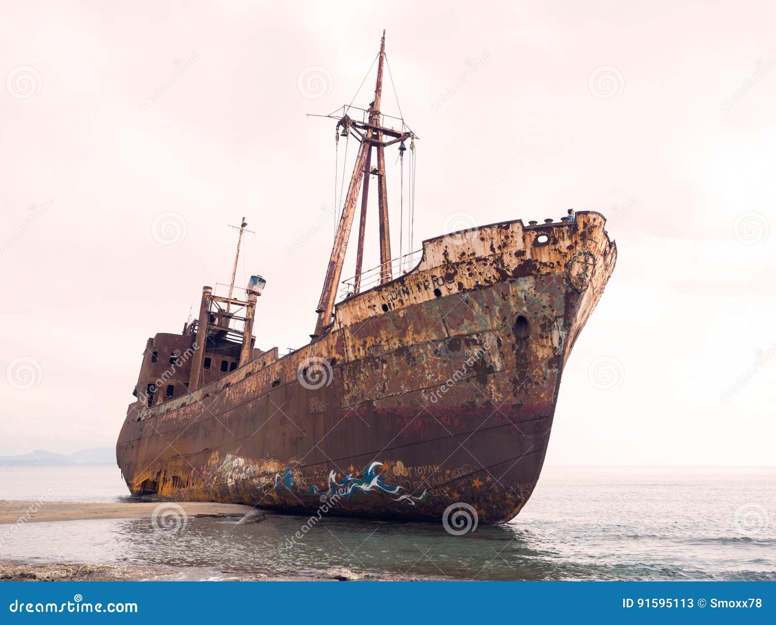 Shipwreck in a beach editorial stock photo. Image of shipwreck - 91595113