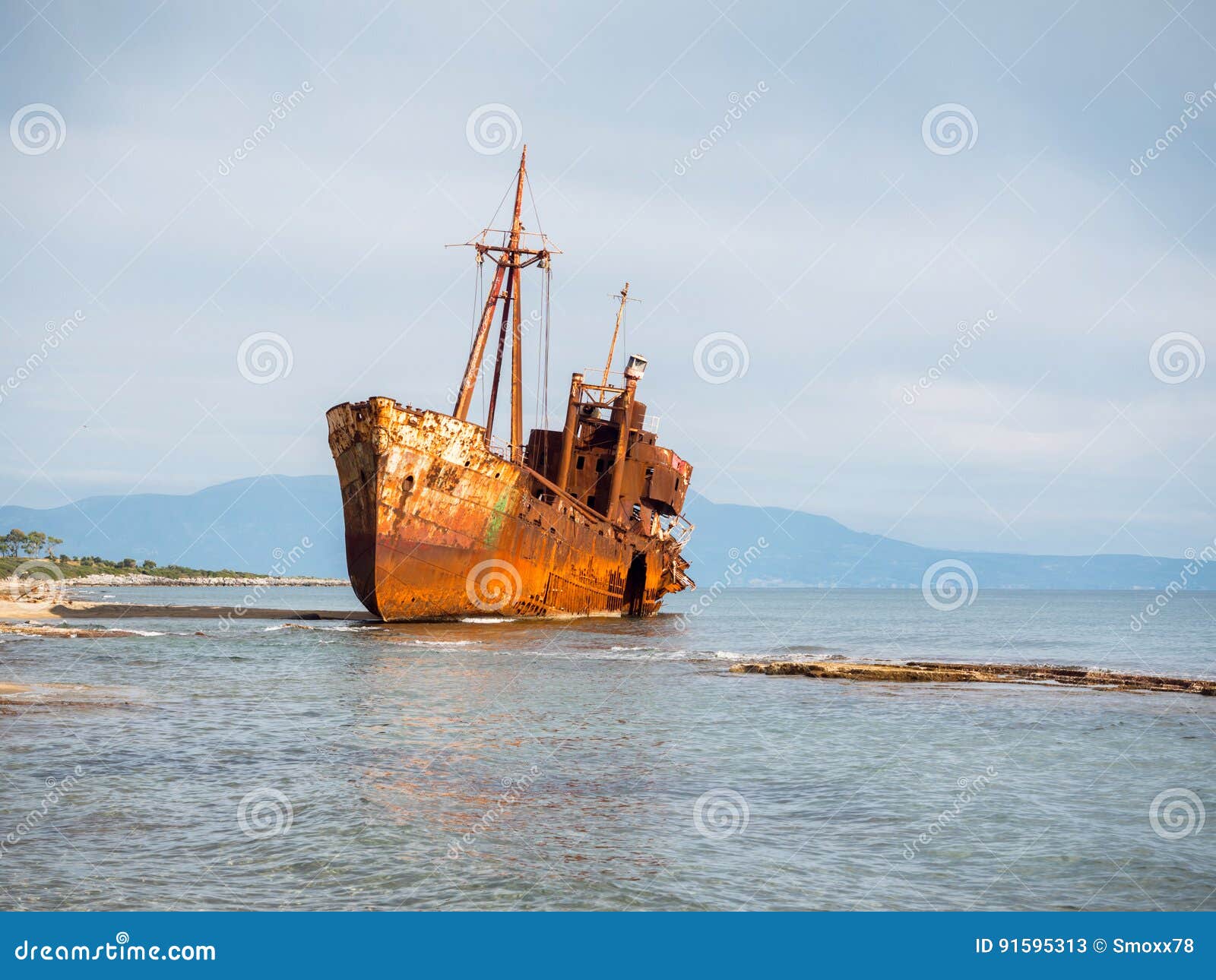 Shipwreck in a beach stock image. Image of metal, shipwreck - 91595313