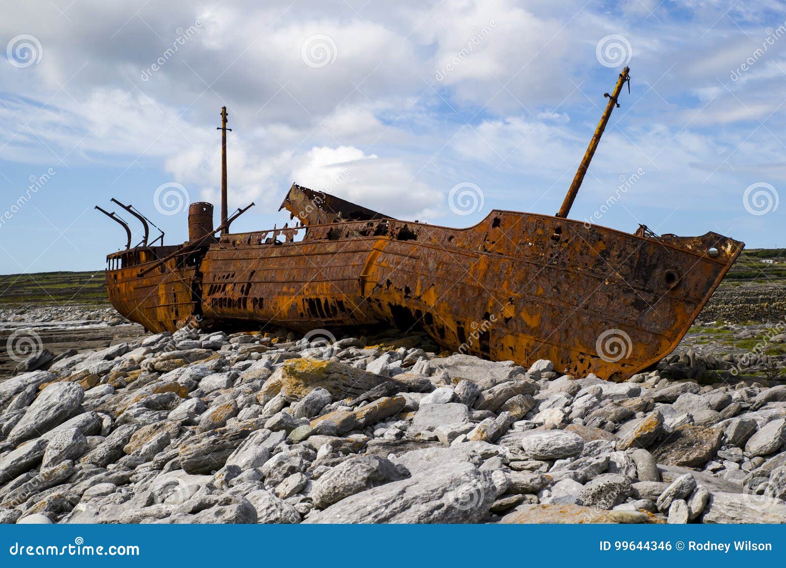 Shipwreck on the Rocks stock photo. Image of beach, ship - 99644346