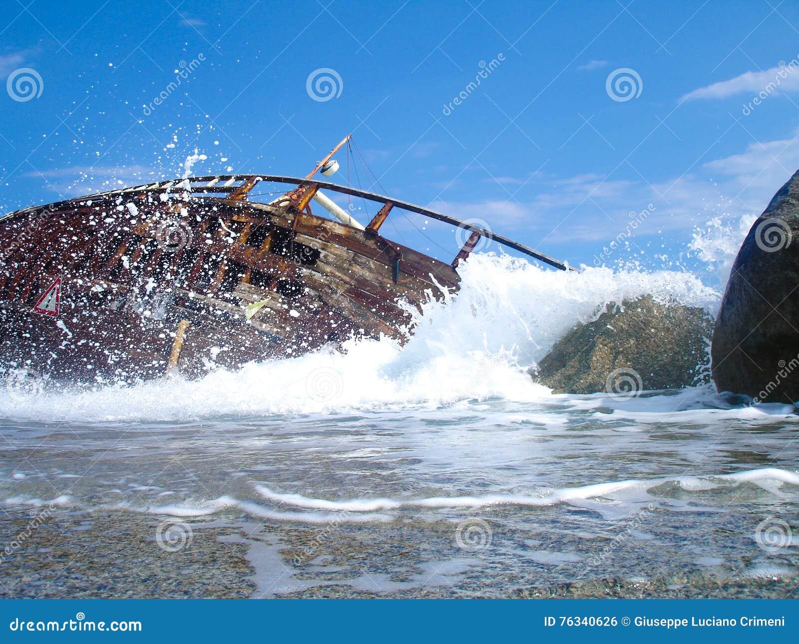 Shipwreck of a Sailing Ship after a Storm with Blue Sky. Stock Photo ...