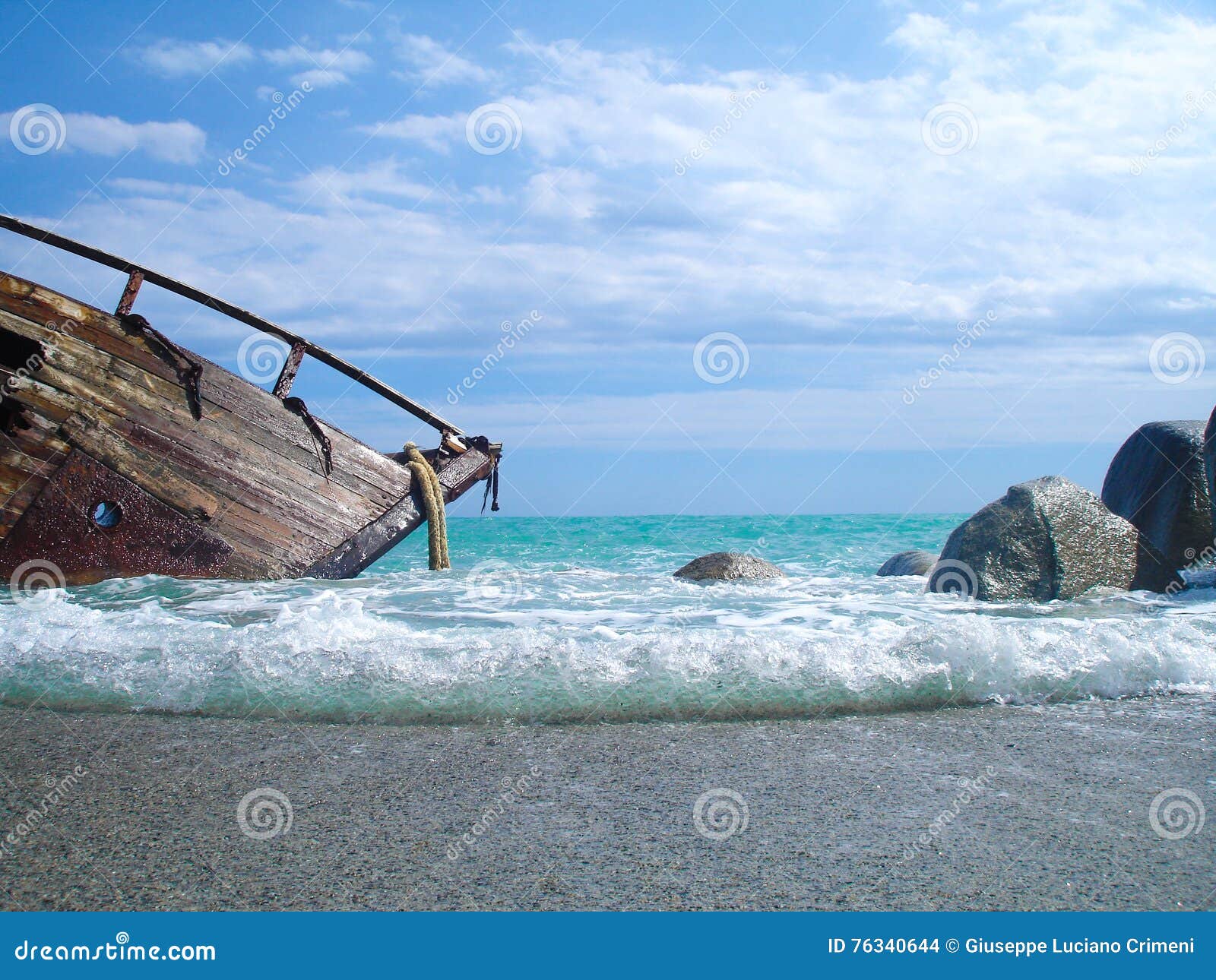 Shipwreck of a Sailing Ship after a Storm with Blue Sky. Stock Photo ...