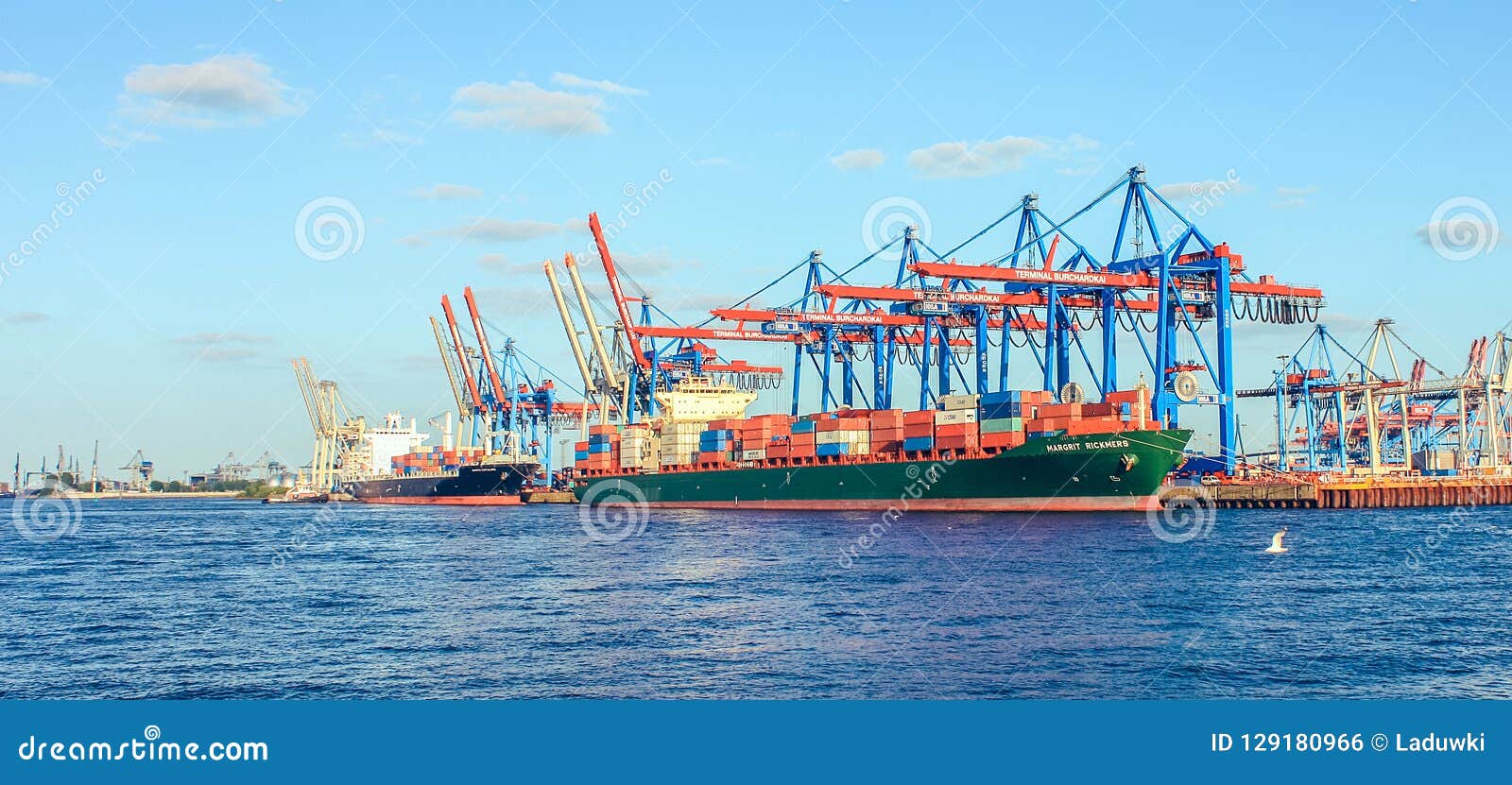 Shipyard and Harbor Shipbuilding with Crane Machine and Container Ship ...