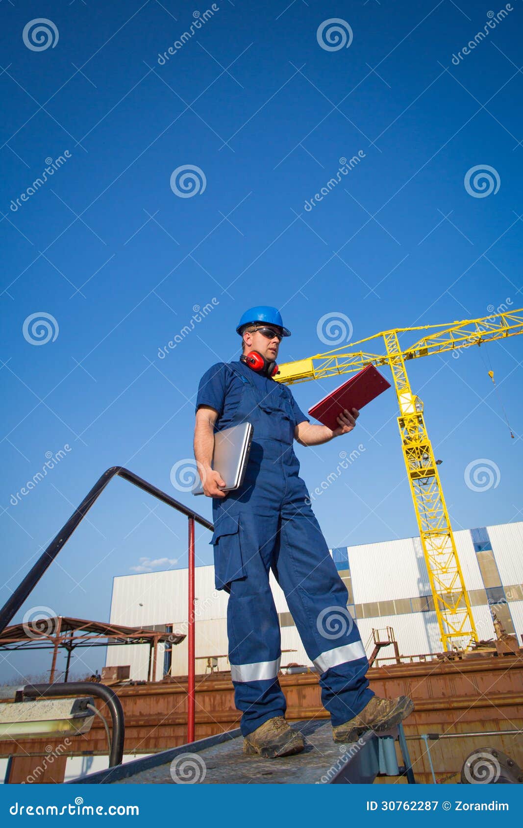 Shipyard workers stock image. Image of folder, clothing - 30762287