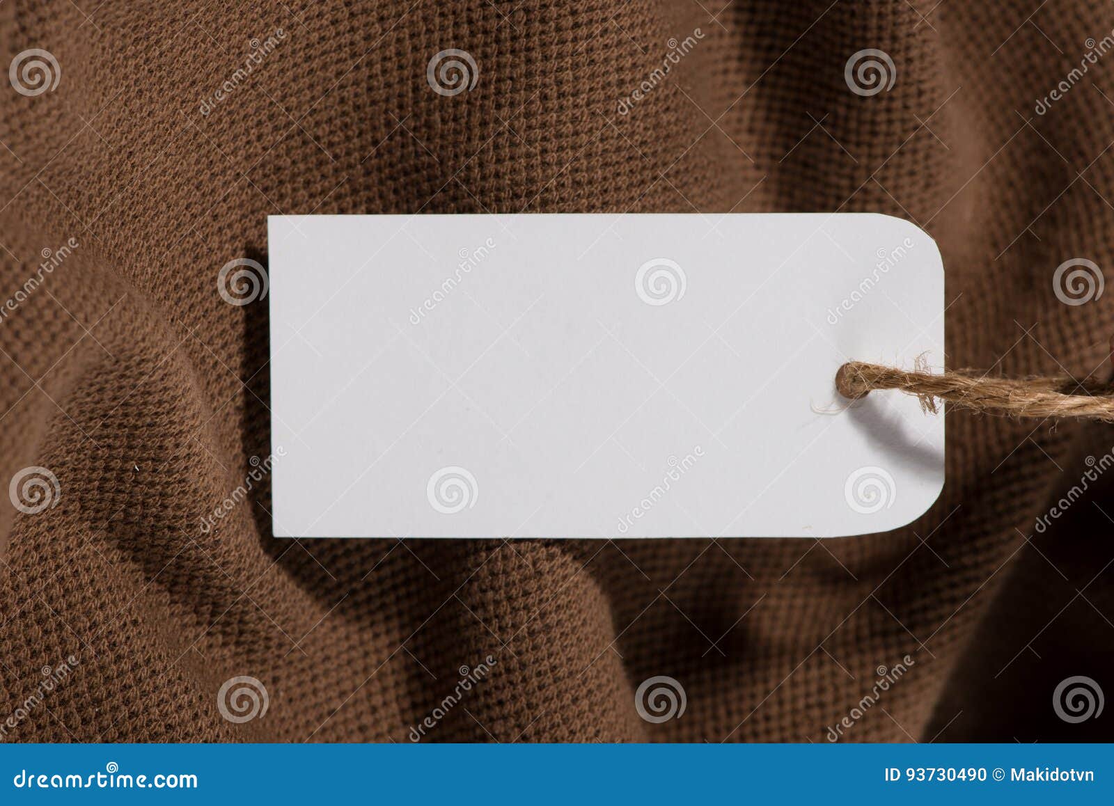 Shirt Price Tag. Rectangular Tag is Attached To a Sweater Stock Photo ...