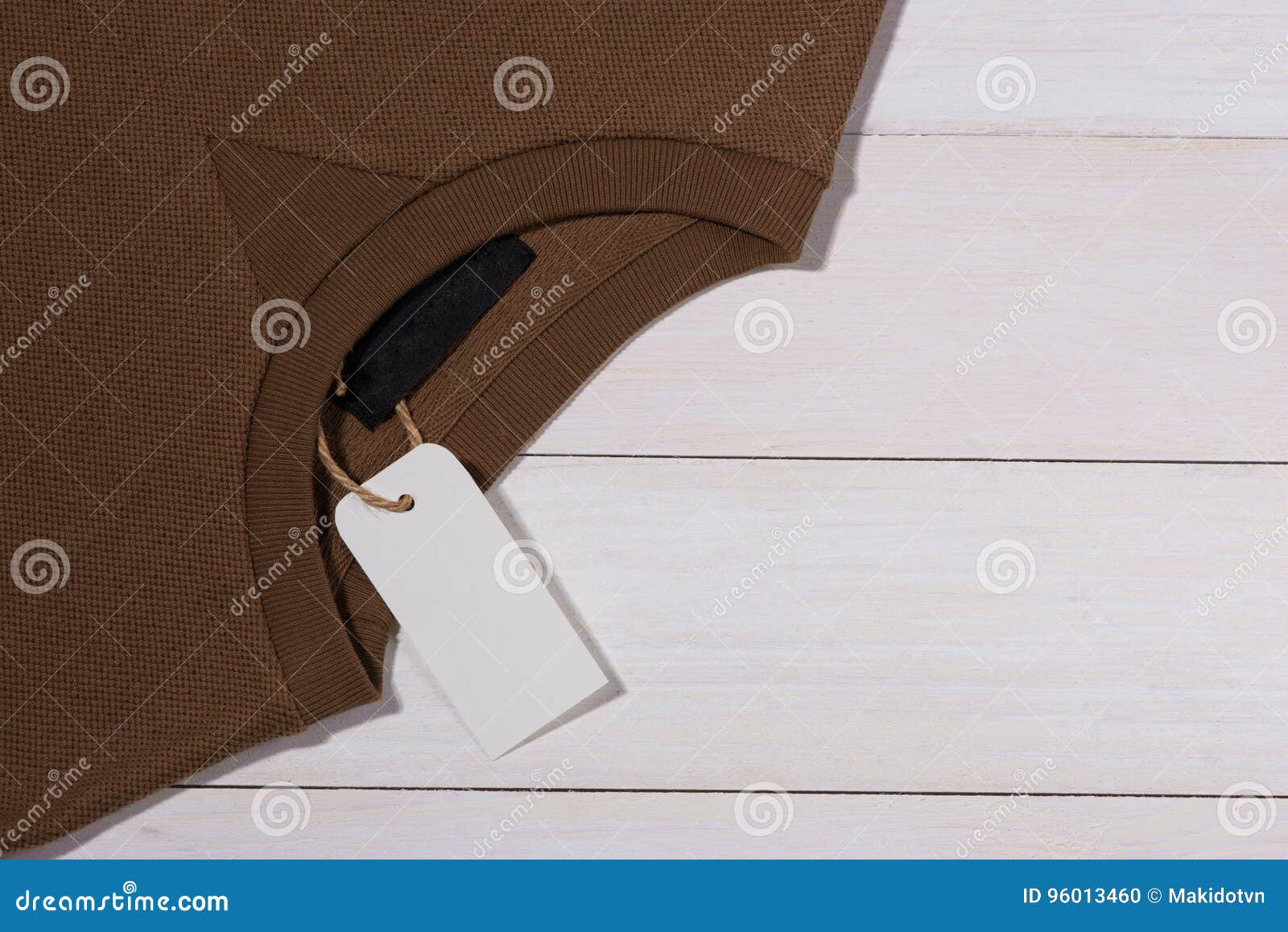 Shirt Price Tag. Rectangular Tag is Attached To a Sweater Stock Photo ...