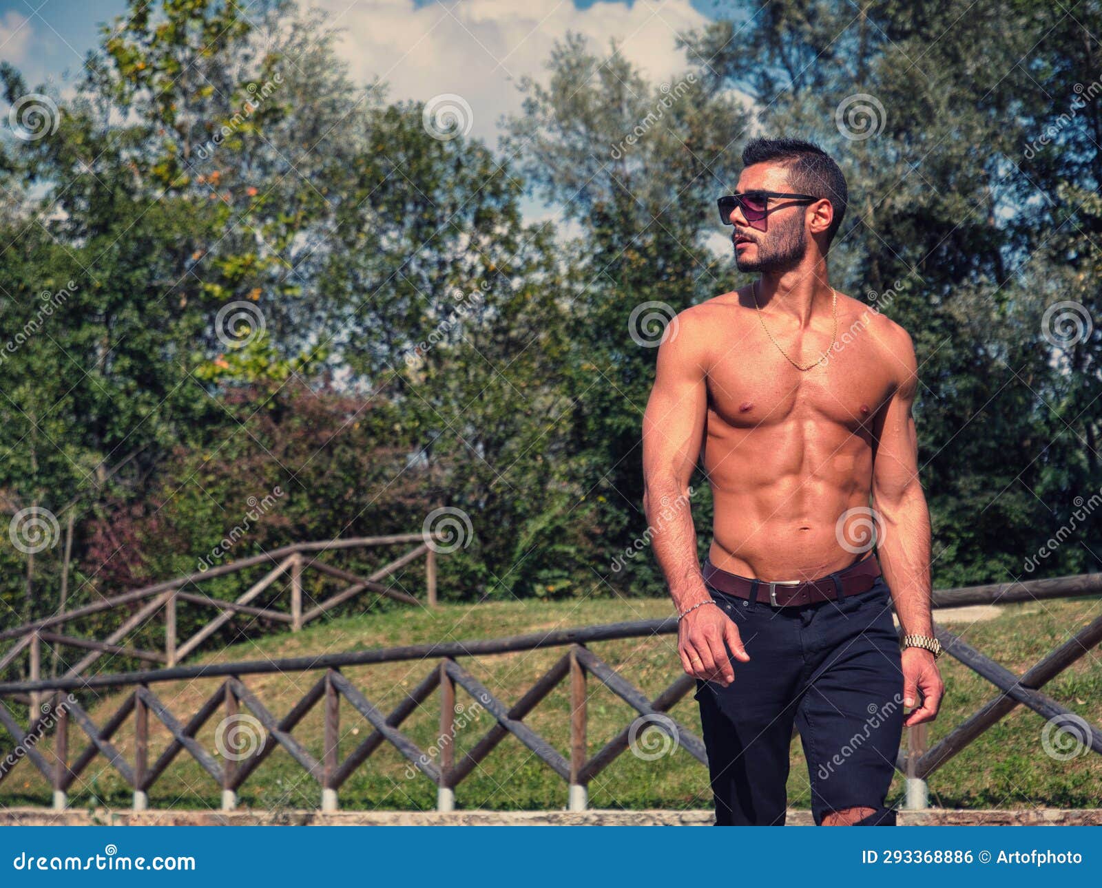 Photo of a Shirtless Man Walking Down a Path Stock Photo - Image of ...