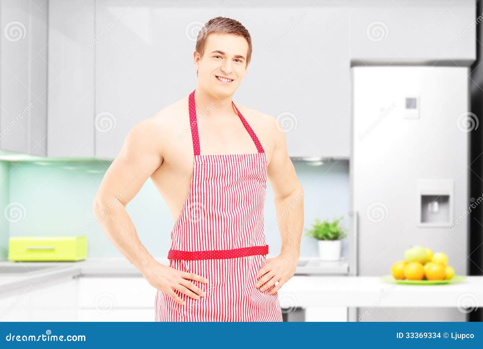 Shirtless Male Cooker with Apron Posing in a Kitchen Stock Photo ...