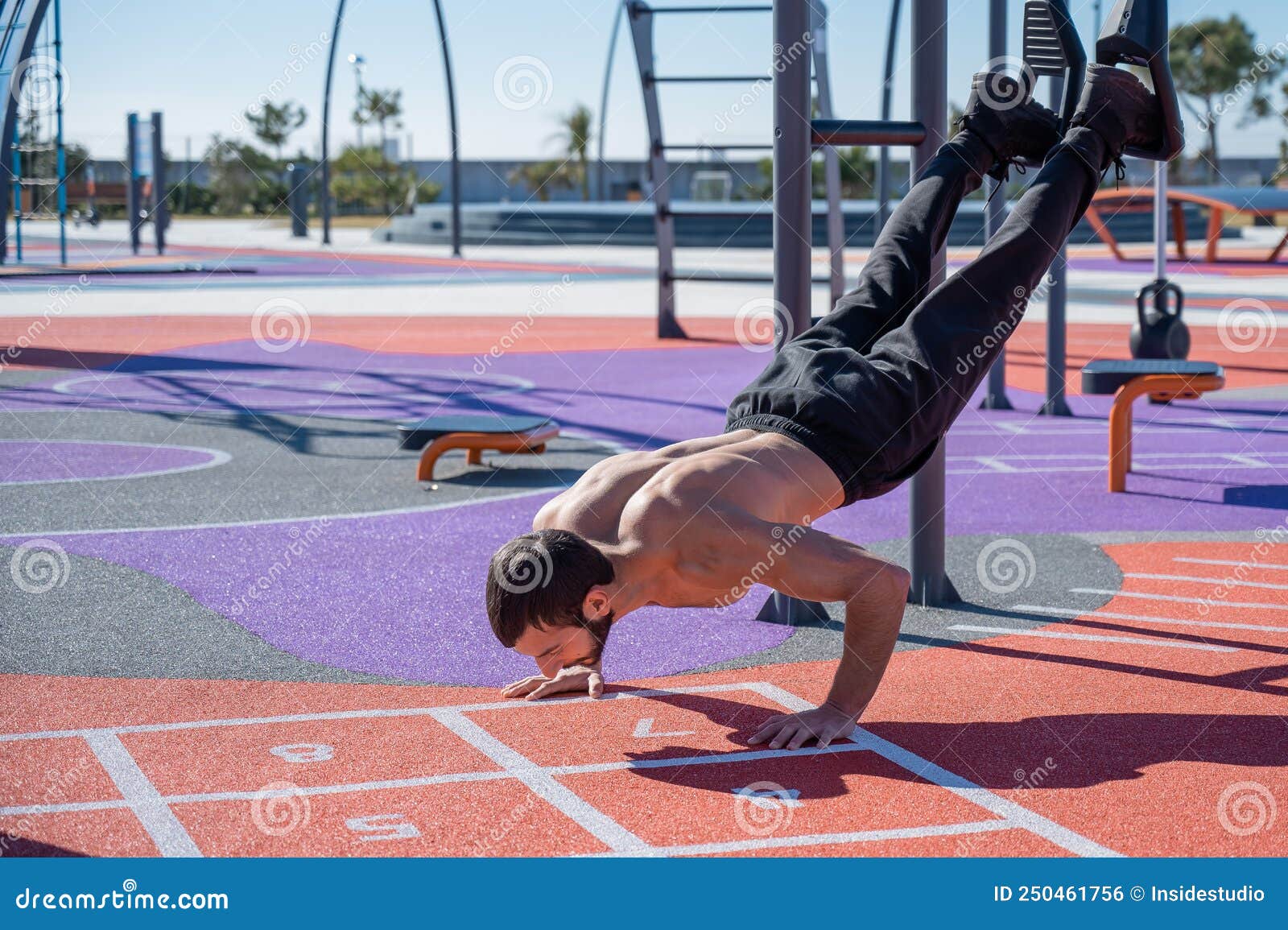 Shirtless Man Doing Loop Exercises Outdoors. Stock Photo - Image of ...