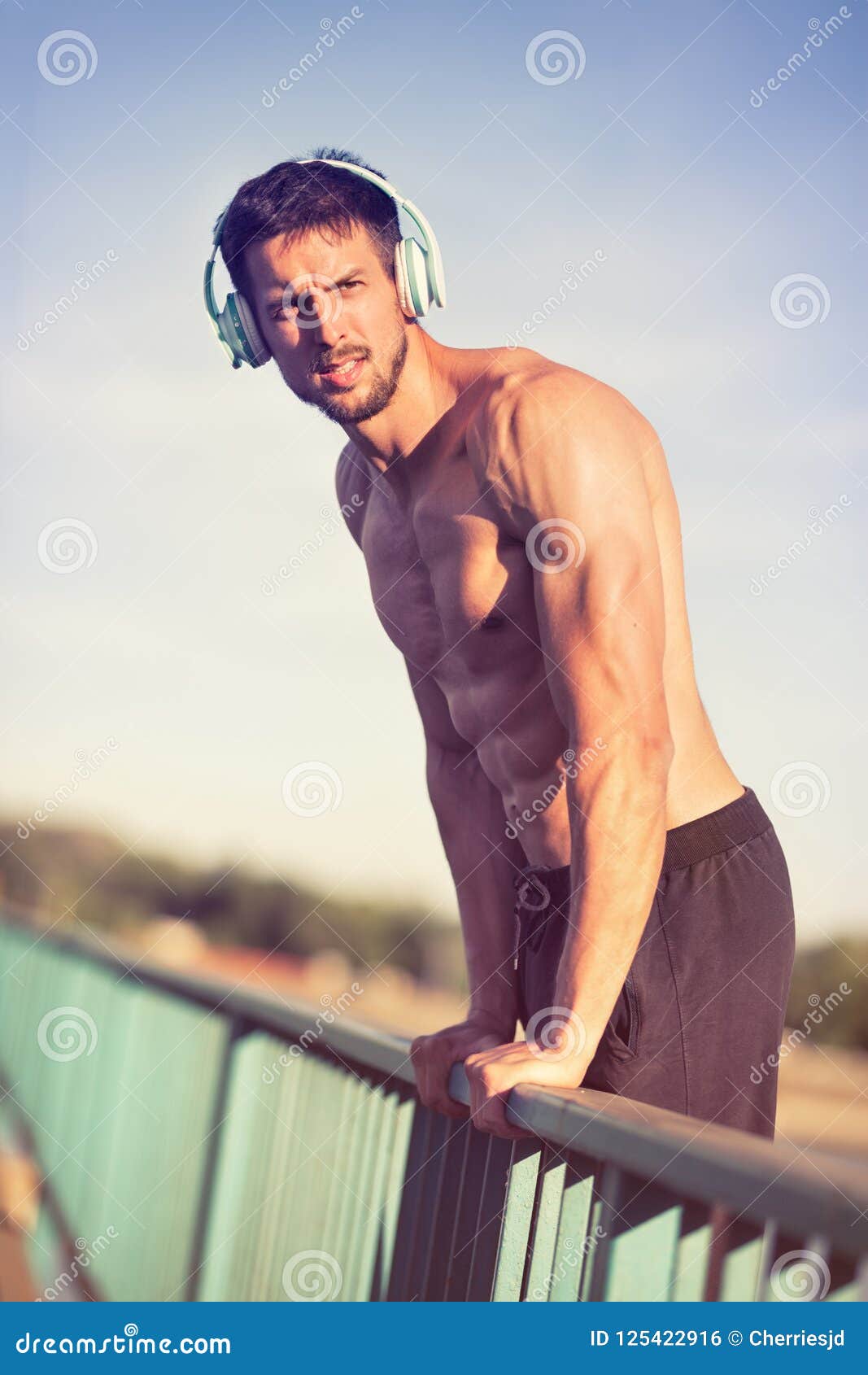 Shirtless Muscular Man Doing Dips Stock Photo - Image of athlete ...