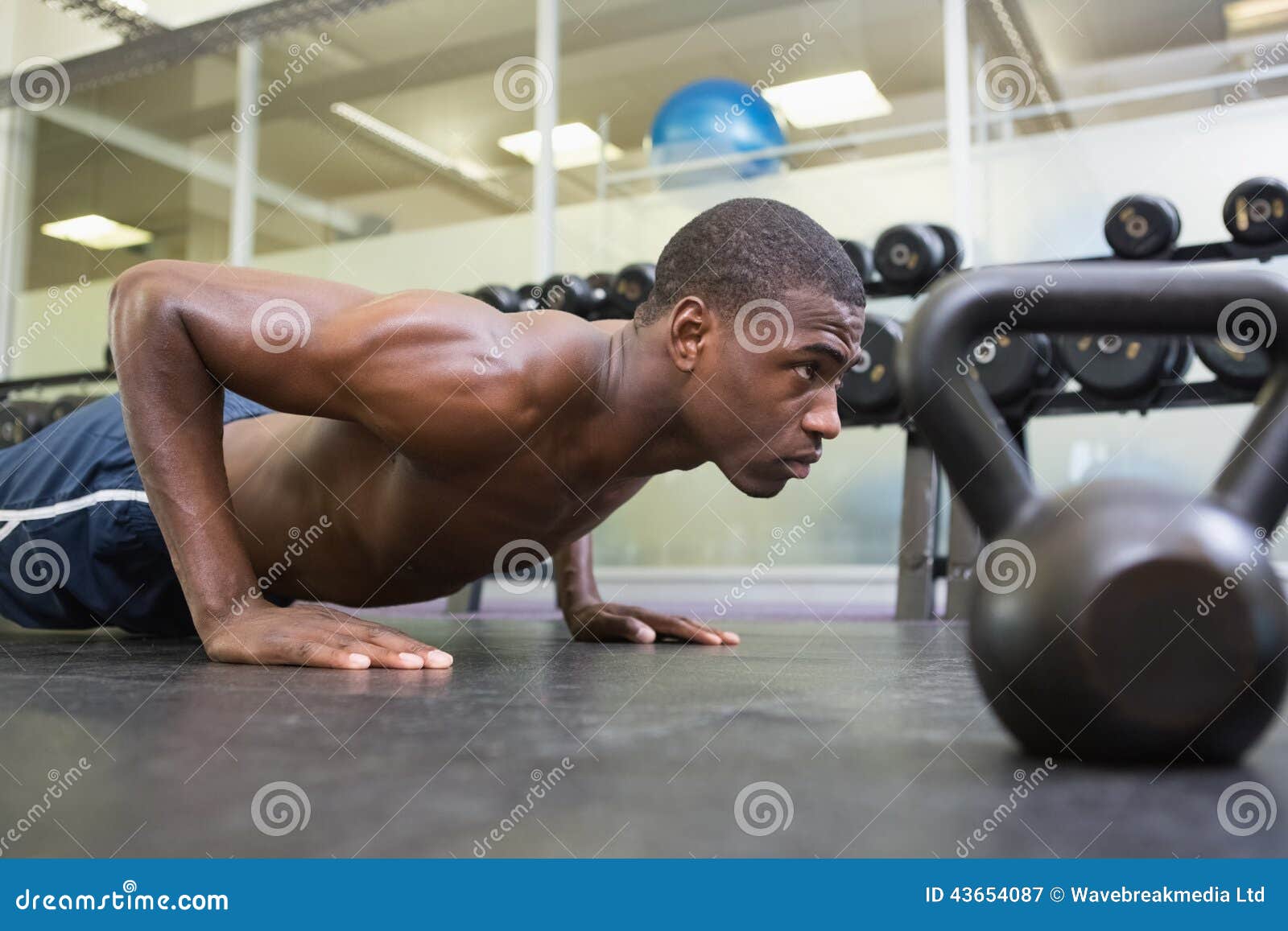 Shirtless Muscular Man Doing Push Ups in Gym Stock Image - Image of ...