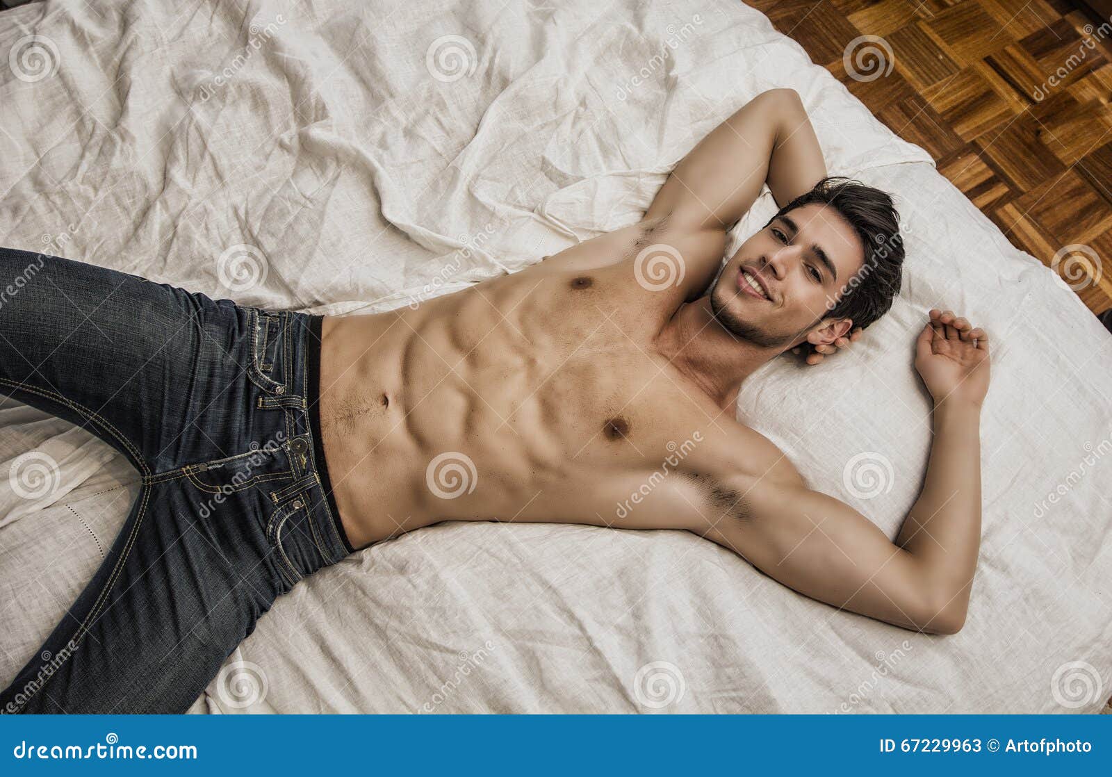 Shirtless Male Model Lying Alone on His Bed Stock Image - Image of ... Shirtless Male Model Lying Alone on His Bed Stock Image - Image of ...
