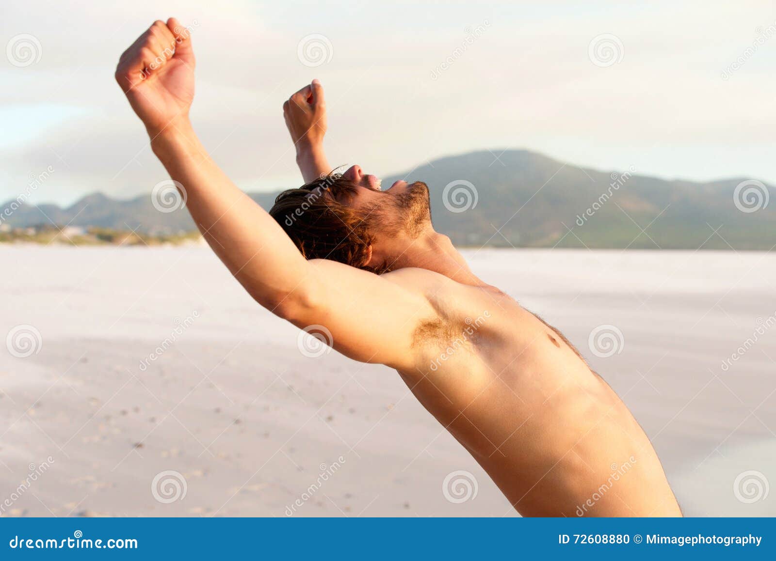 Shirtless Young Man with Arms Raised Stock Photo - Image of hair, face ...