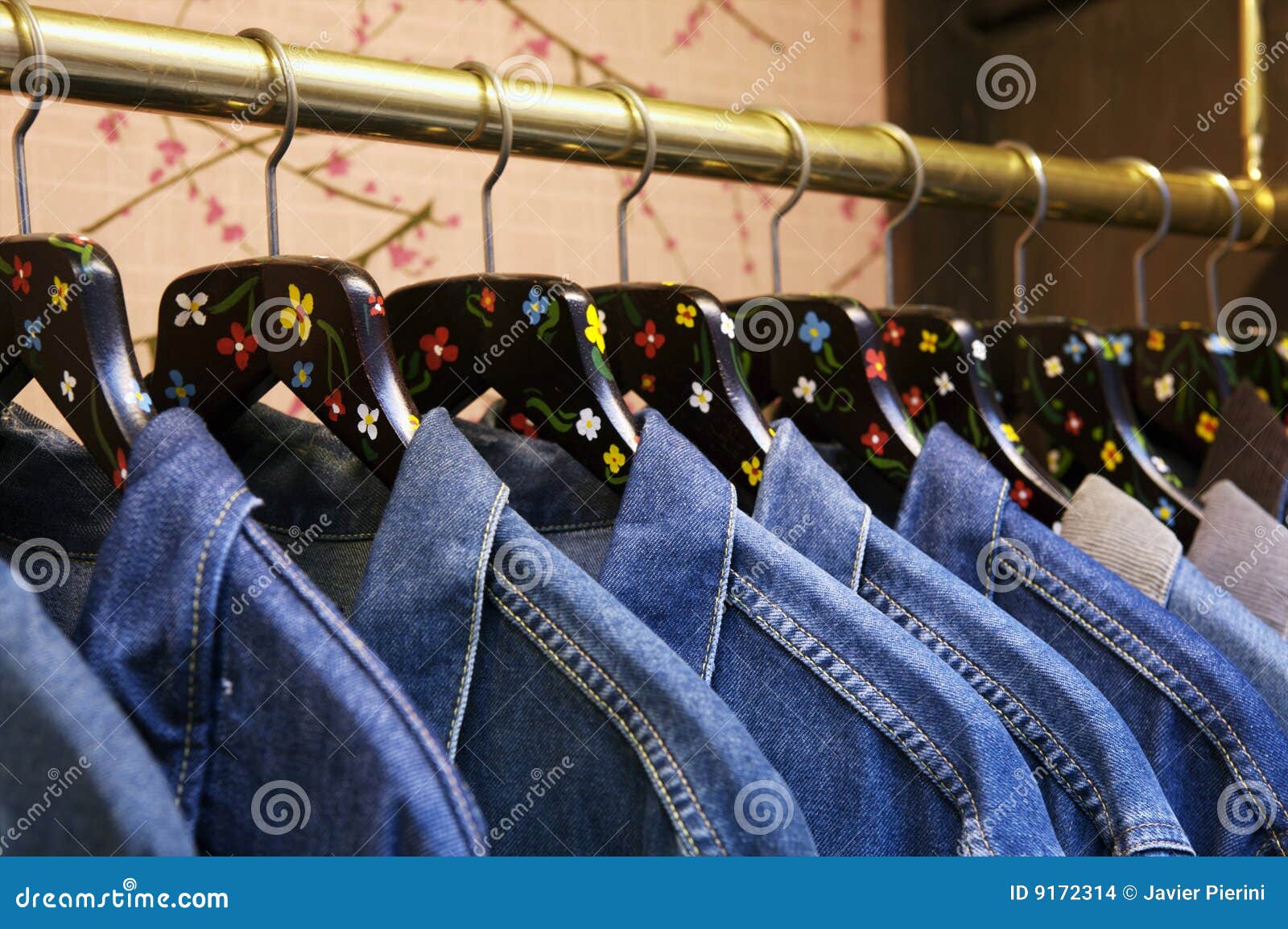 Shirts on Clothes Rack stock photo. Image of abundance - 9172314