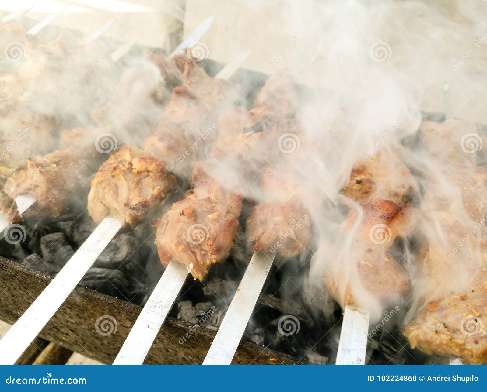 Shish Kebab on Metal Sticks Roasted on the Grill Stock Photo - Image of ...
