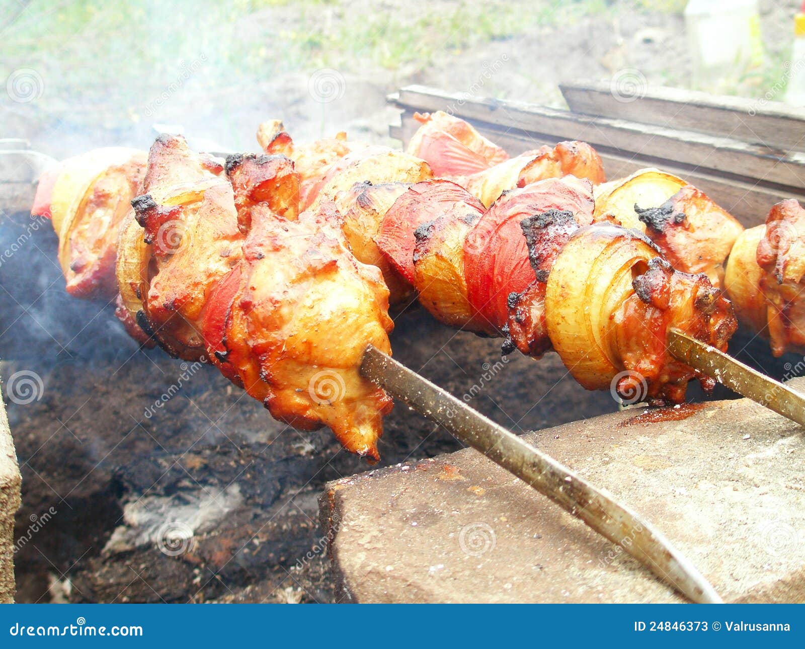 Shish kebab preparation stock image. Image of fire, making - 24846373