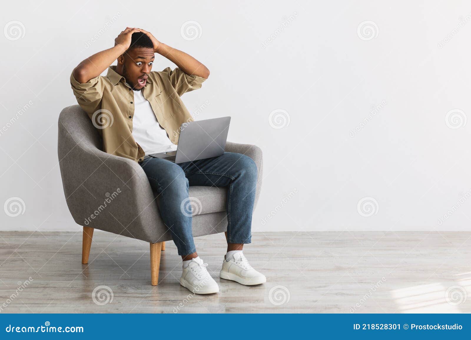 Shocked Black Man Looking at Laptop Having Problem, Gray Background ...