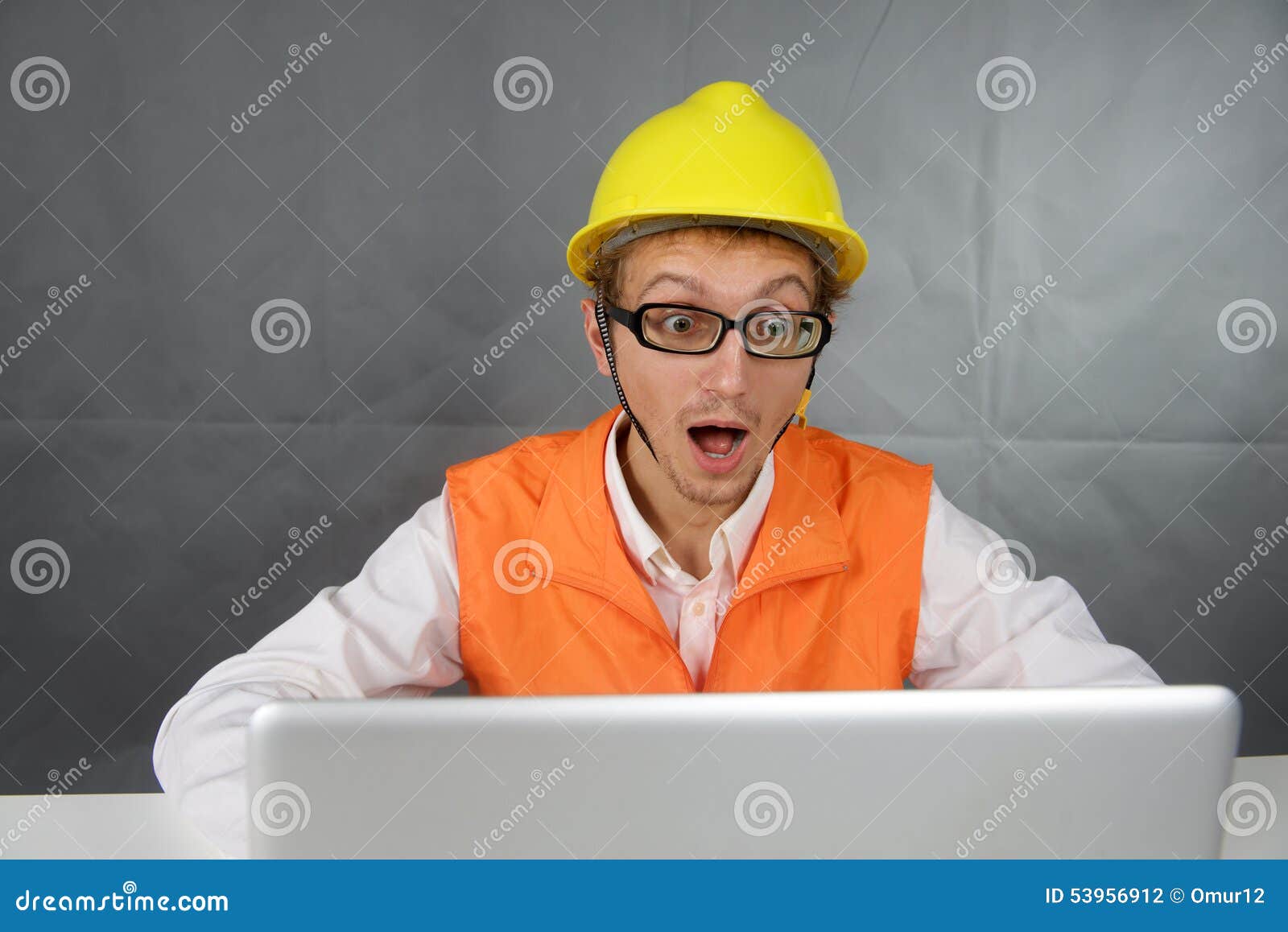 Shocked Builder with Computer. Stock Photo - Image of study, sitting ...