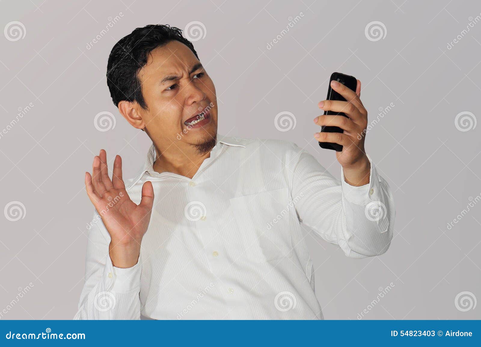 Shocked Businessman With Cell Phone Stock Image Image Of Male Device