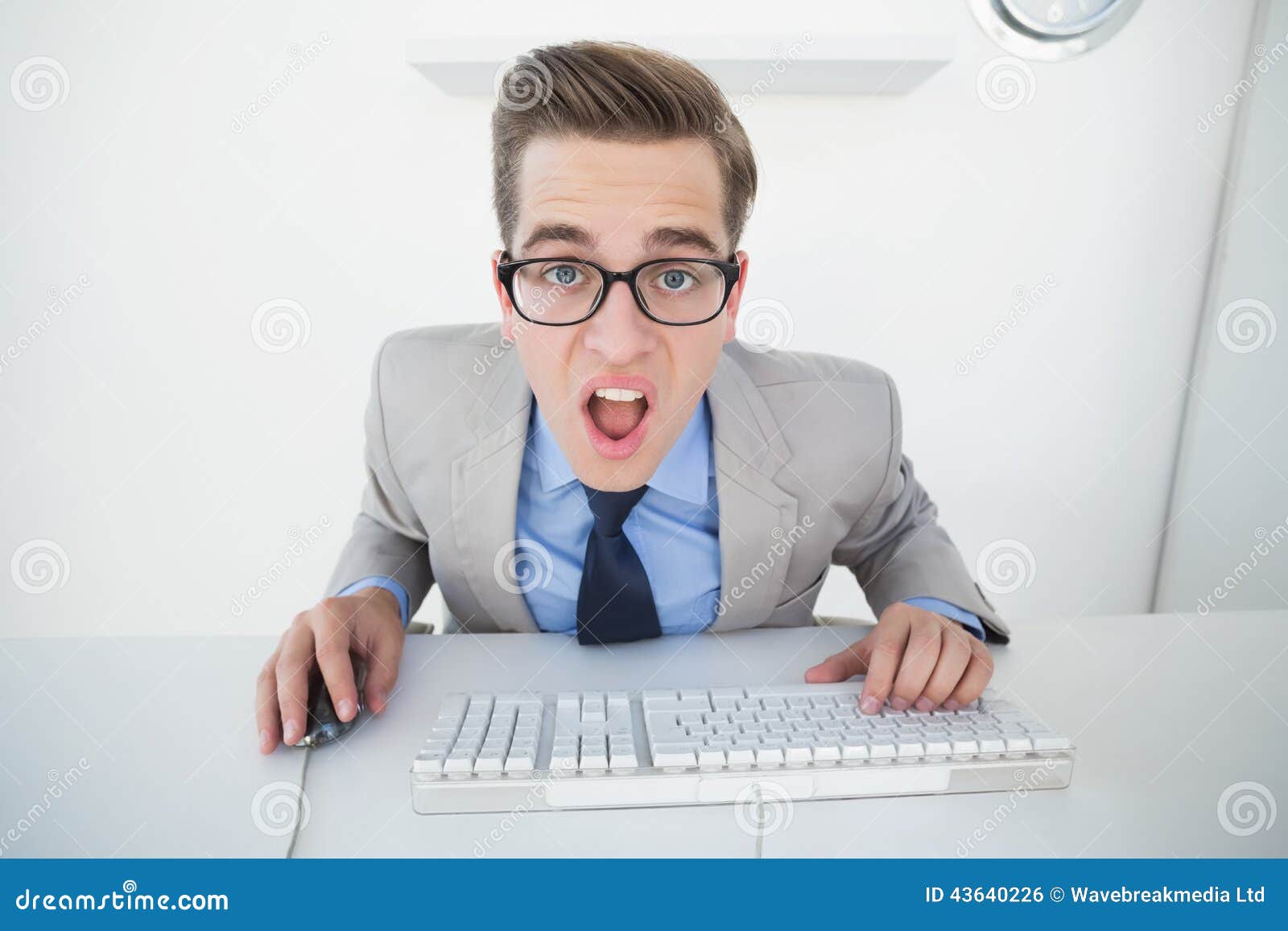 Shocked Businessman Working on Computer Stock Photo - Image of head ...