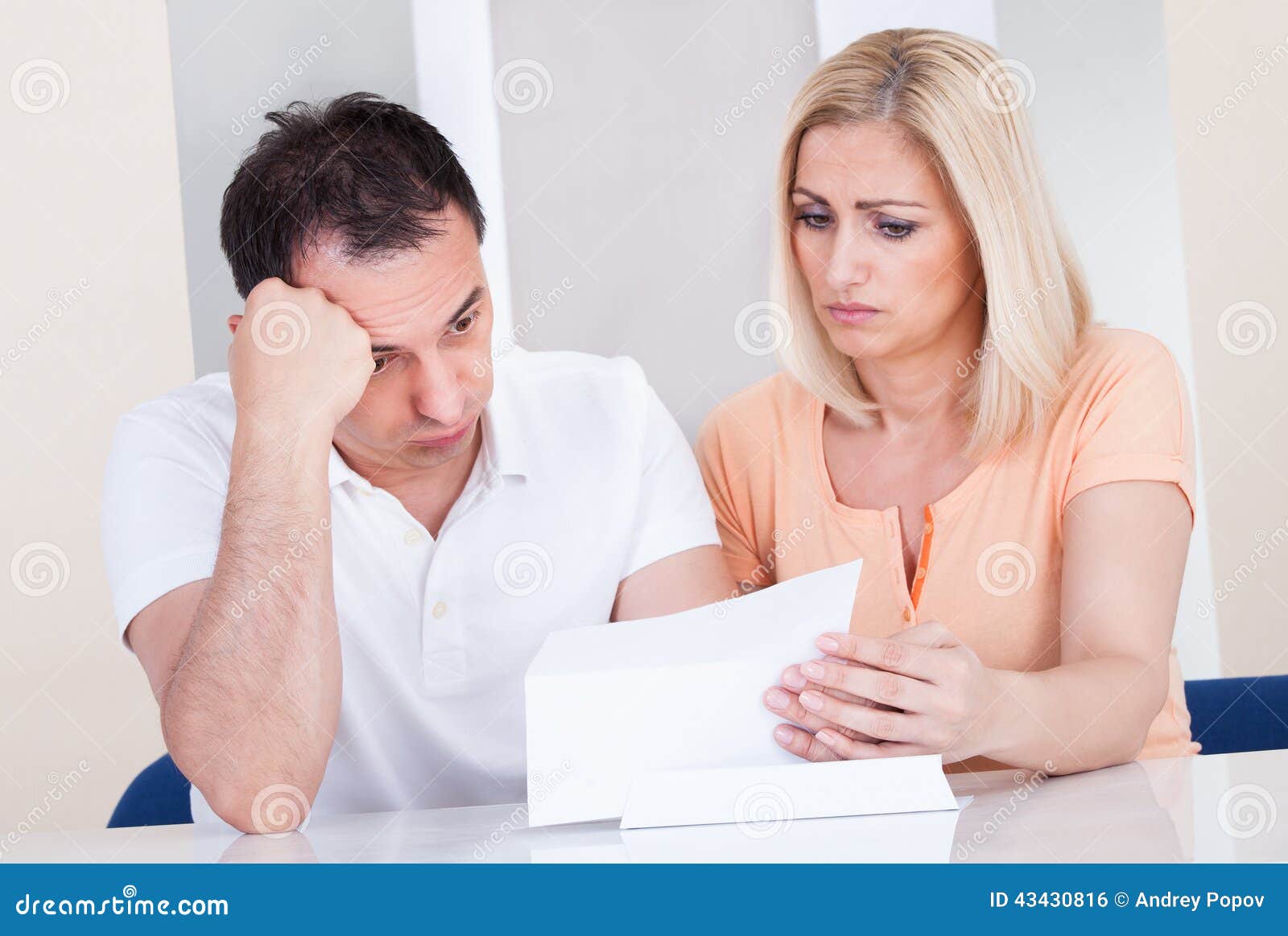 Shocked Couple Looking at Bill Stock Photo - Image of casual, family ...