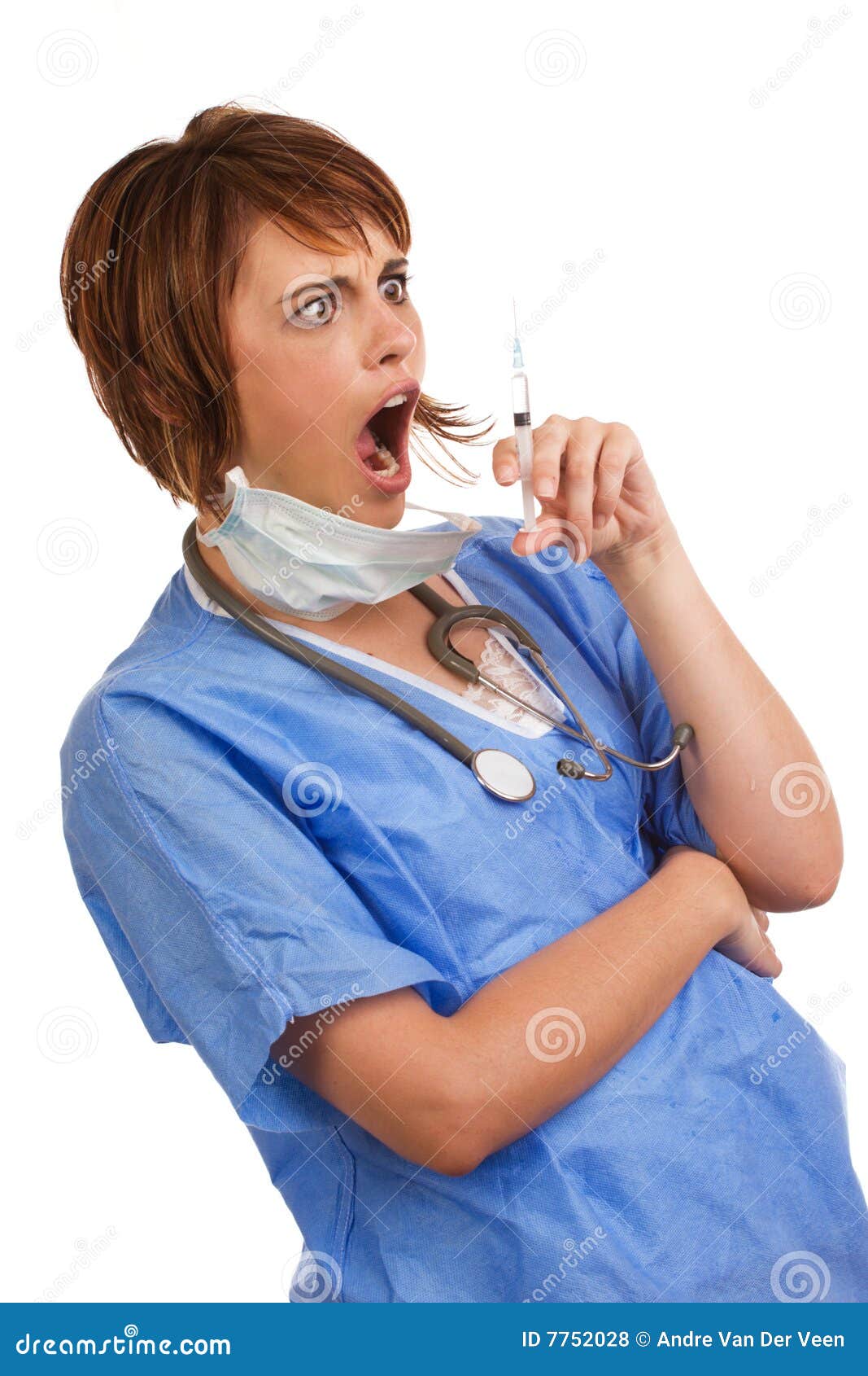 Shocked Female Looking At Control Line On Pregnancy Test While Sitting