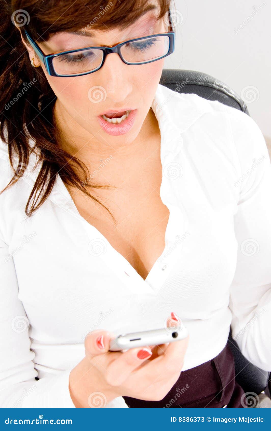 Shocked Female Looking At Control Line On Pregnancy Test While Sitting