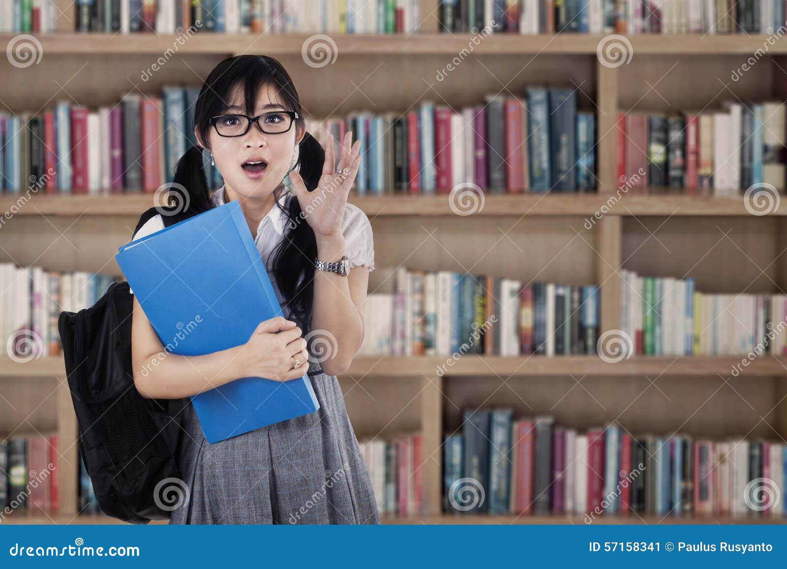 Shocked Female Student at Library Stock Image - Image of astonishment ...