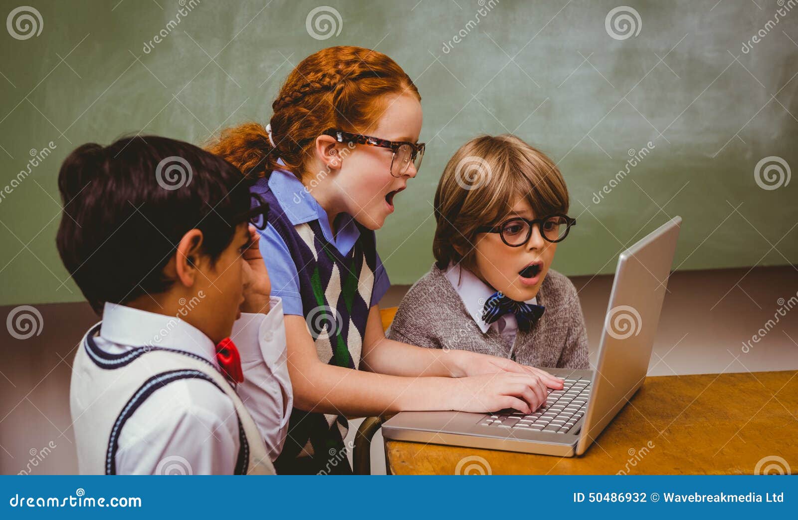 Shocked Little School Kids Using Laptop Stock Photo - Image of ...