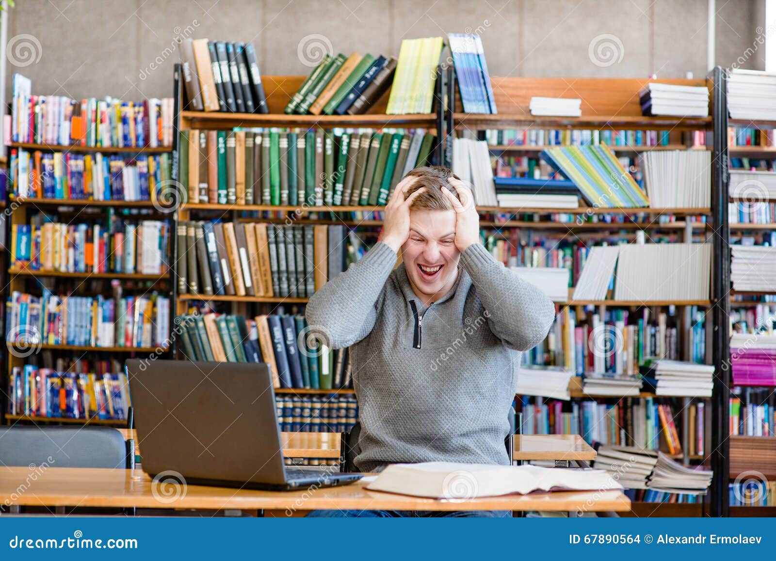 Shocked Male Student in the University Library Stock Photo - Image of ...