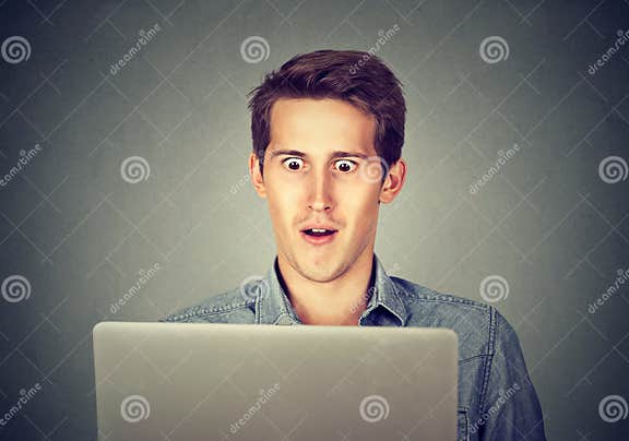 Shocked Man Looking at Laptop Stock Photo - Image of profile, person ...