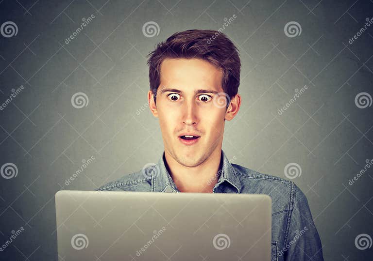 Shocked Man Looking at Laptop Stock Photo - Image of profile, person ...