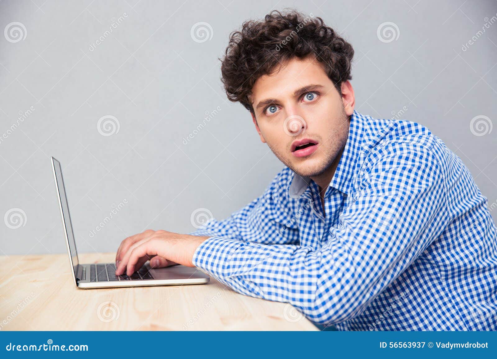 Shocked Man Sitting at the Table with Laptop Stock Image - Image of ...